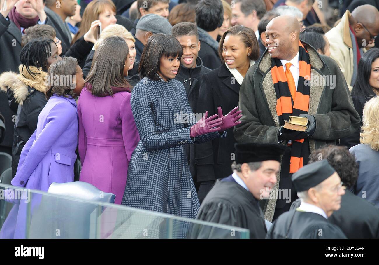 Michelle Obama makes a joke with brother Craig Robinson (right) at the ...