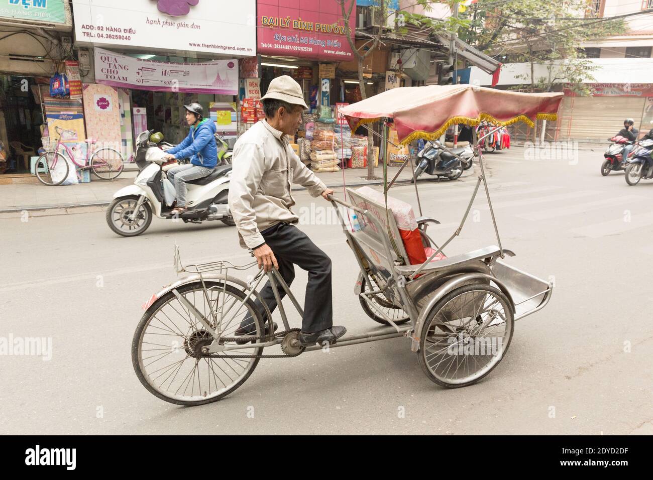 Vietnam Hanoi A cycle driver with cyclo Stock Photo - Alamy