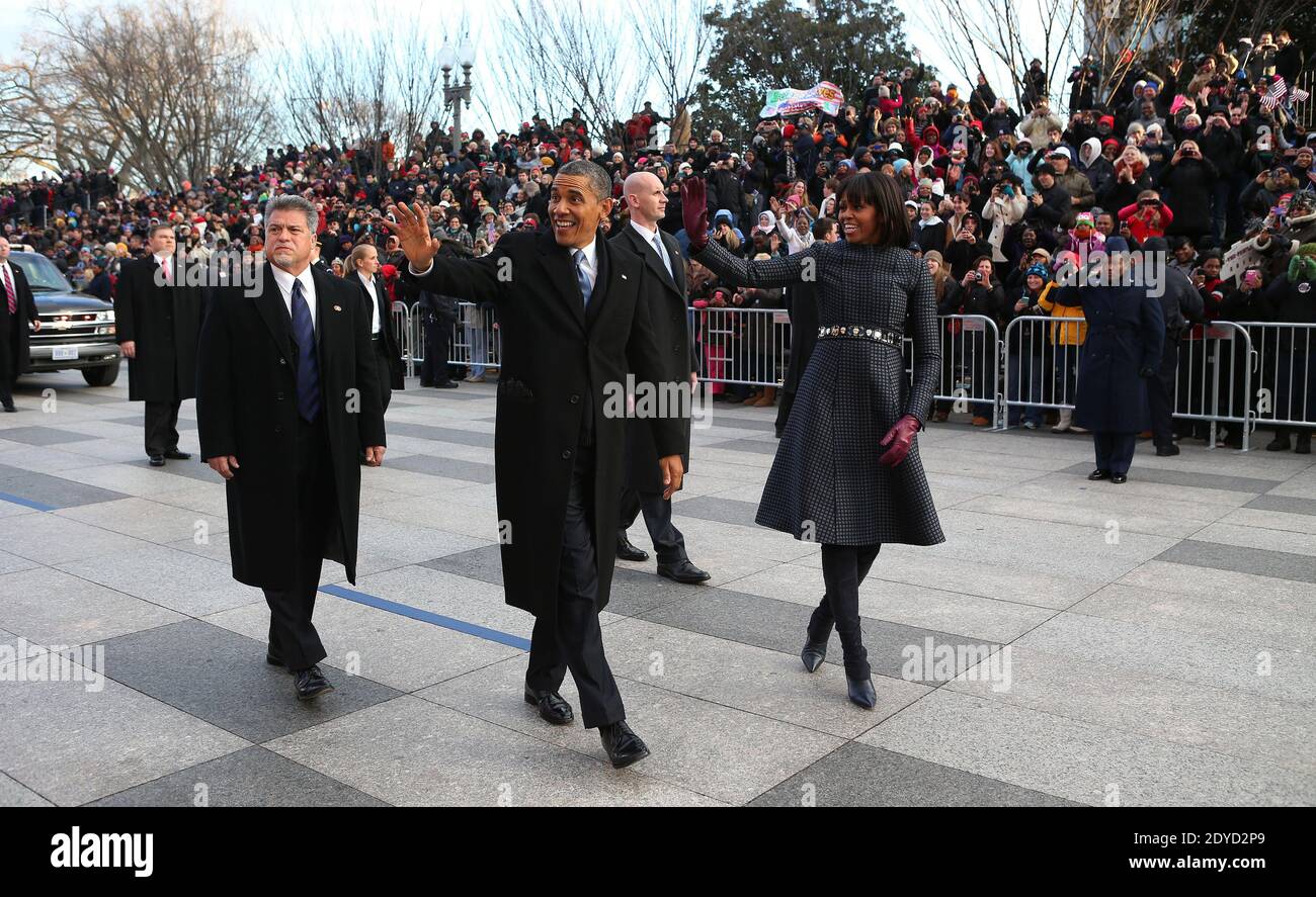 President Barack Obama and first lady Michelle Obama walk the inaugural ...