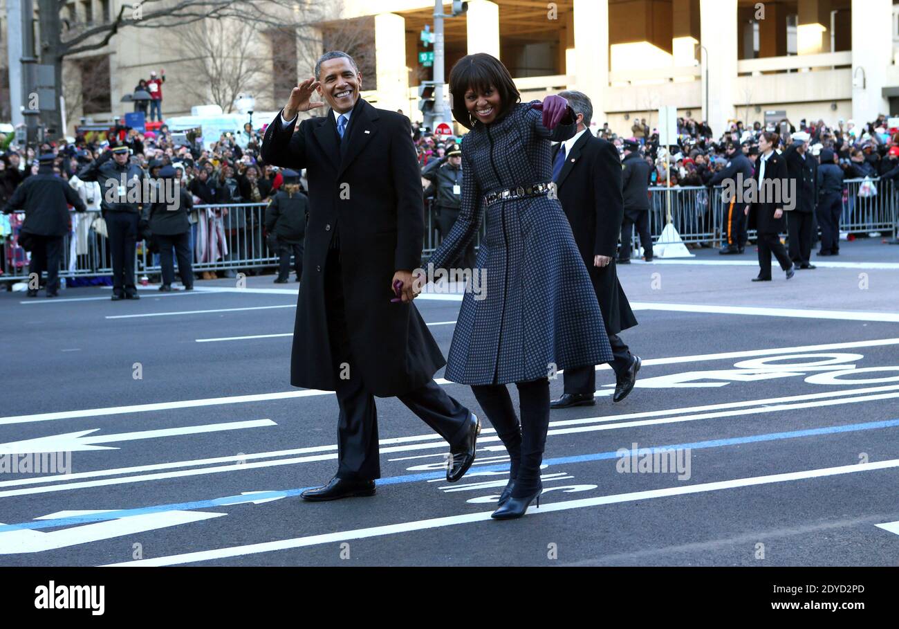 President Barack Obama and first lady Michelle Obama walk the inaugural ...