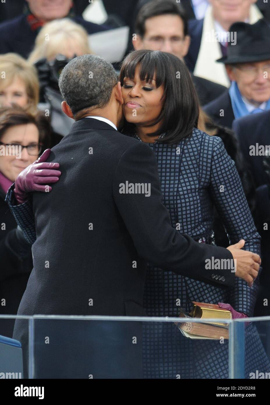 First Lady Michelle Obama hugs her husband after being sworn in as ...