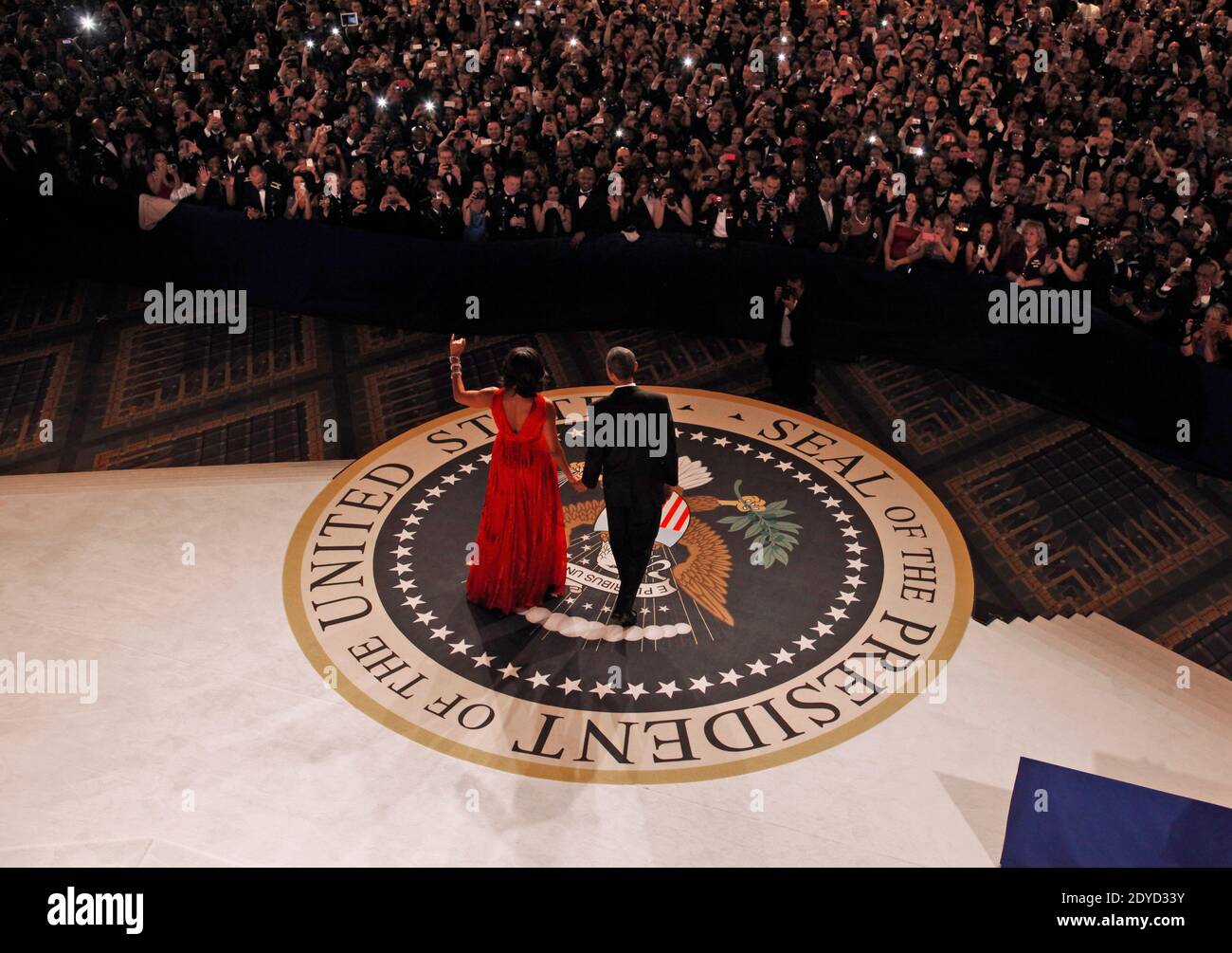 President Barack Obama and first lady Michelle Obama dance together at ...