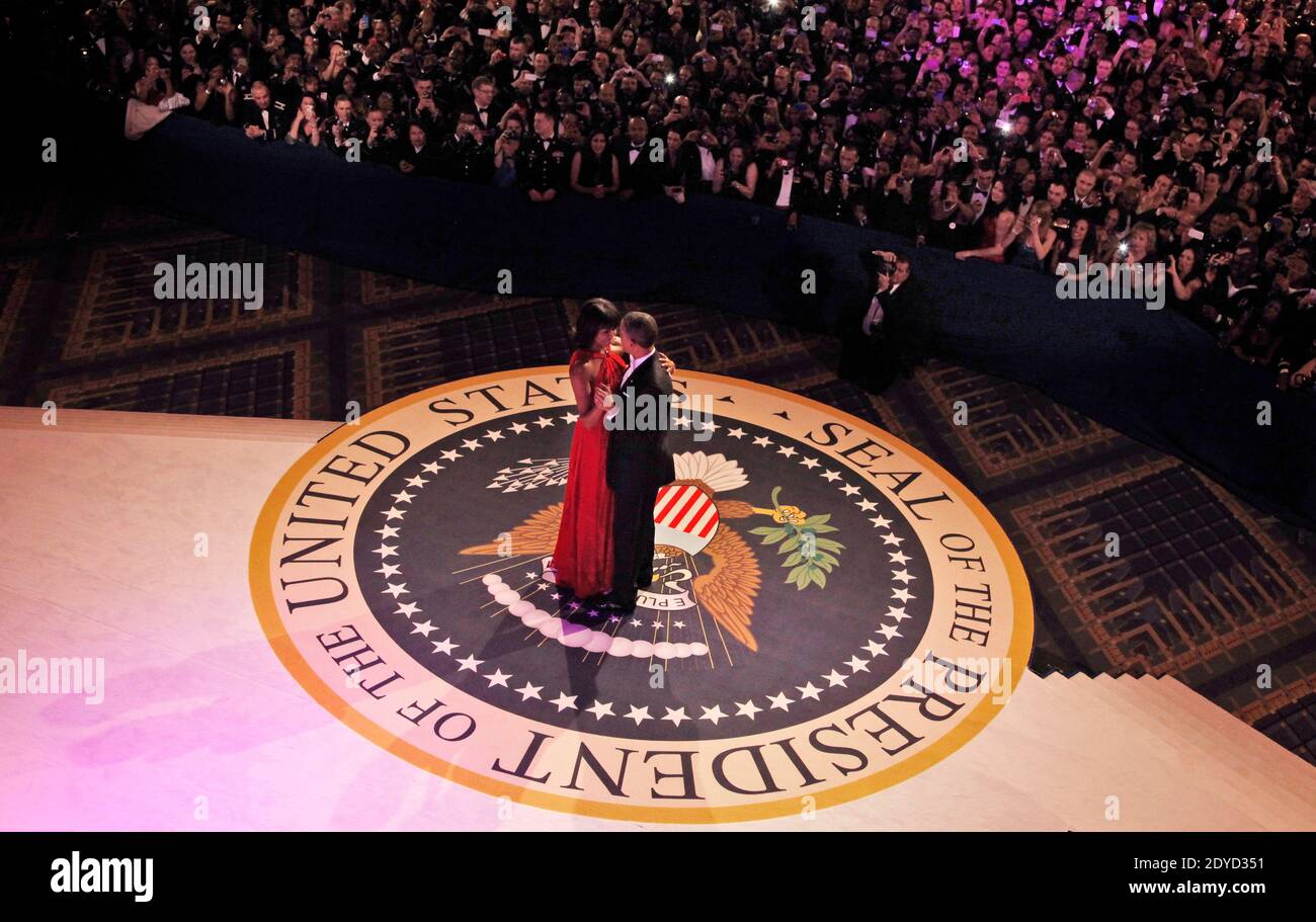 President Barack Obama and first lady Michelle Obama dance together at ...
