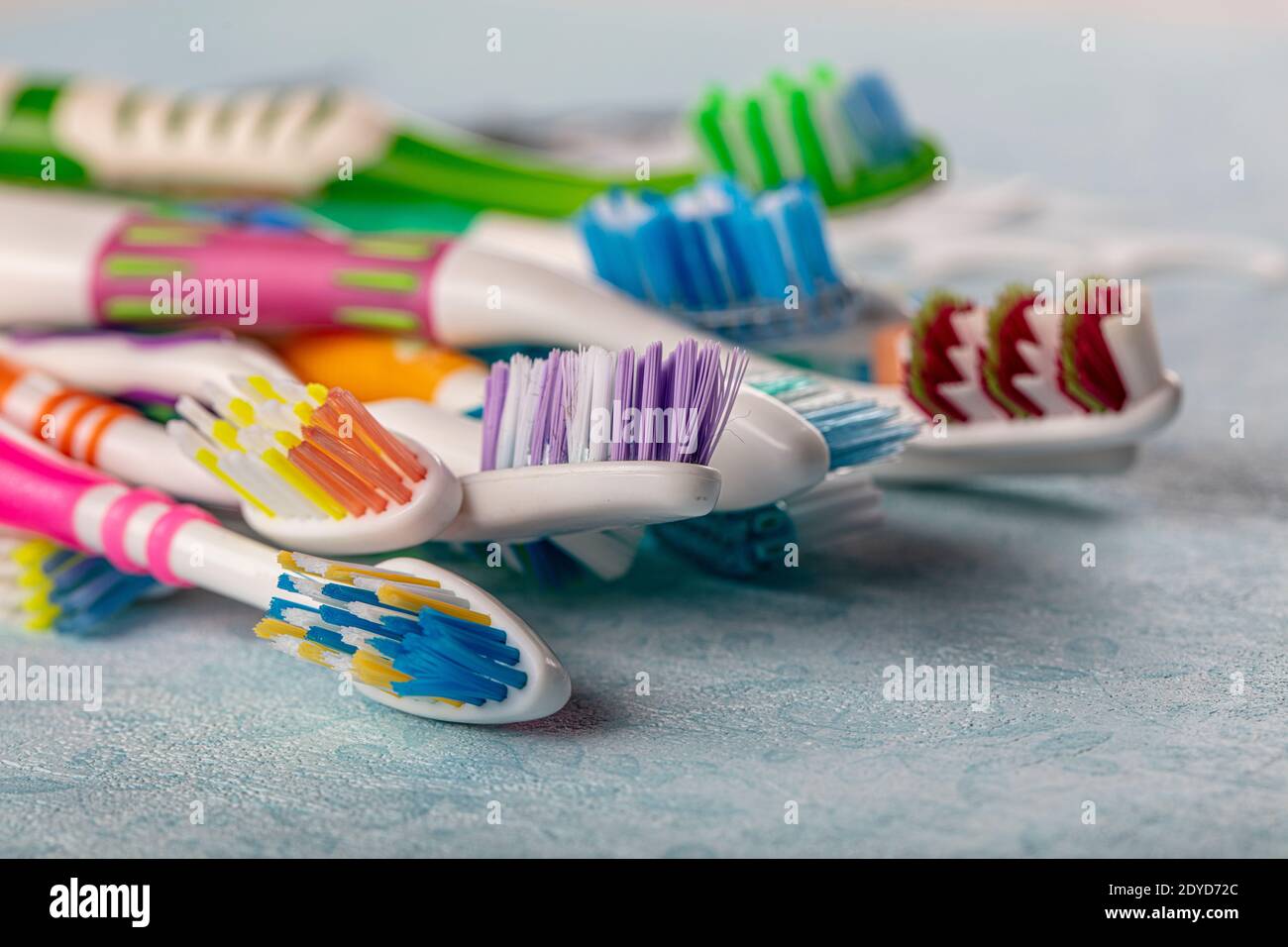 Different multi-colored toothbrushes stock images. Morning hygiene ...