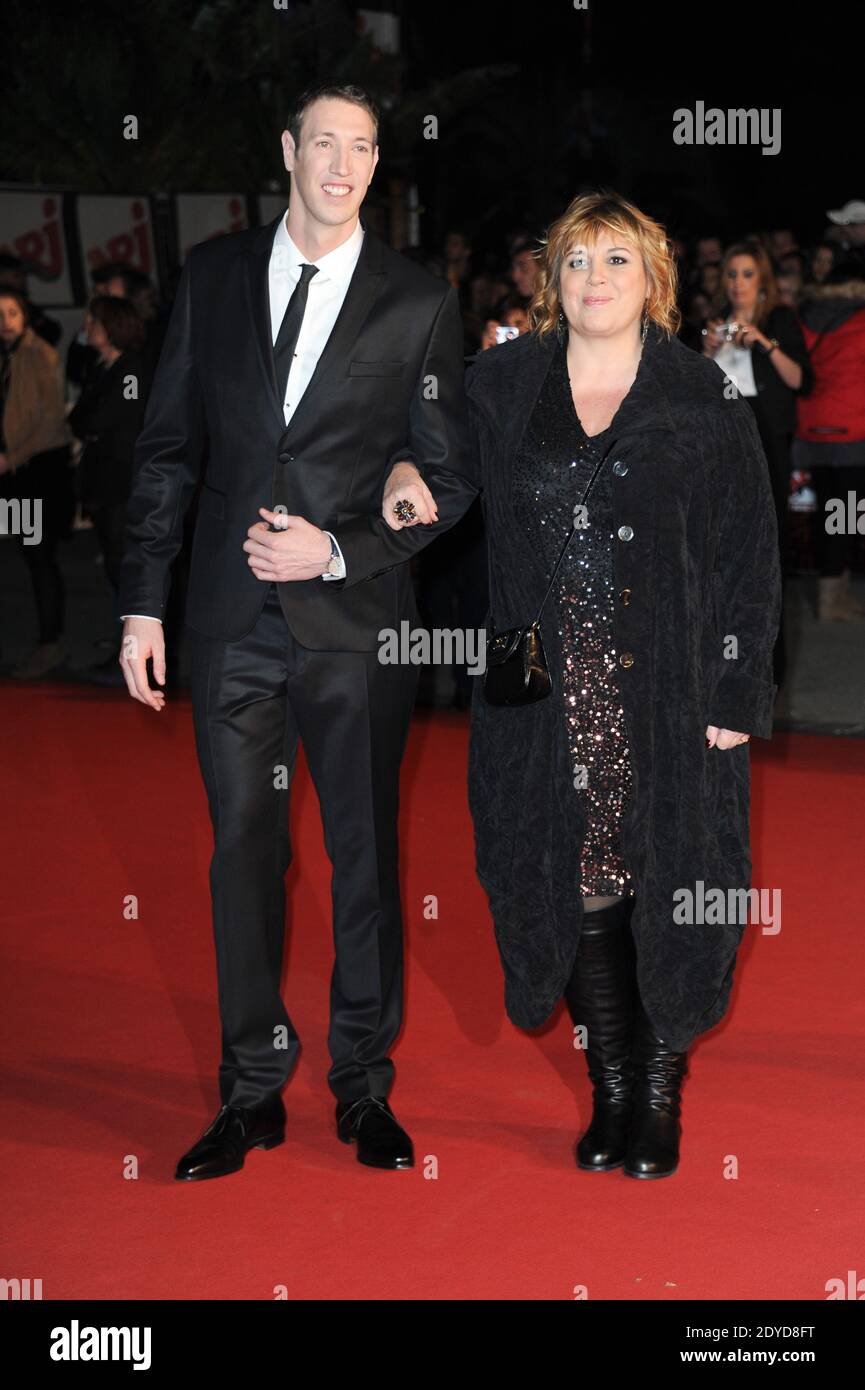 Alain Bernard and Michele Bernier arriving to the 2013 NRJ Music Awards ...
