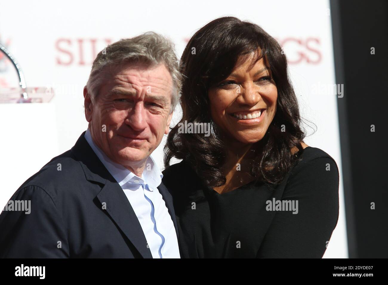 Robert DeNiro and his wife Grace Hightower pose at De Niro's hand and ...