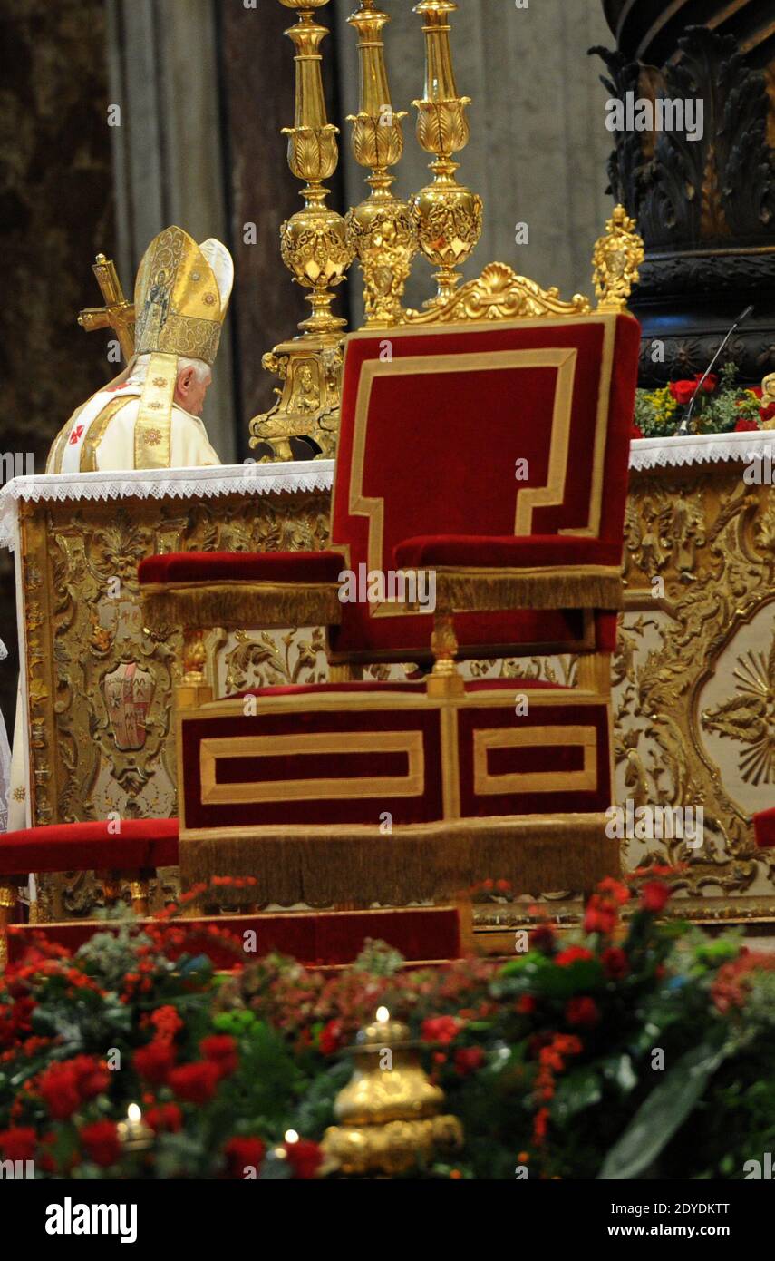 Pope Benedict XVI walks behind his throne as he celebrates a Holy mass ...