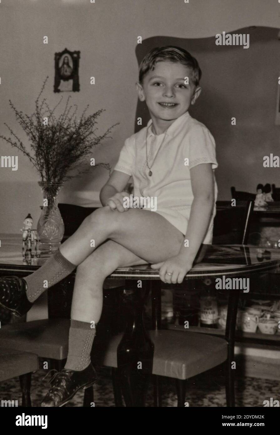 MILAN, ITALY MAY 1957: Child portrait at home in 50s Stock Photo - Alamy
