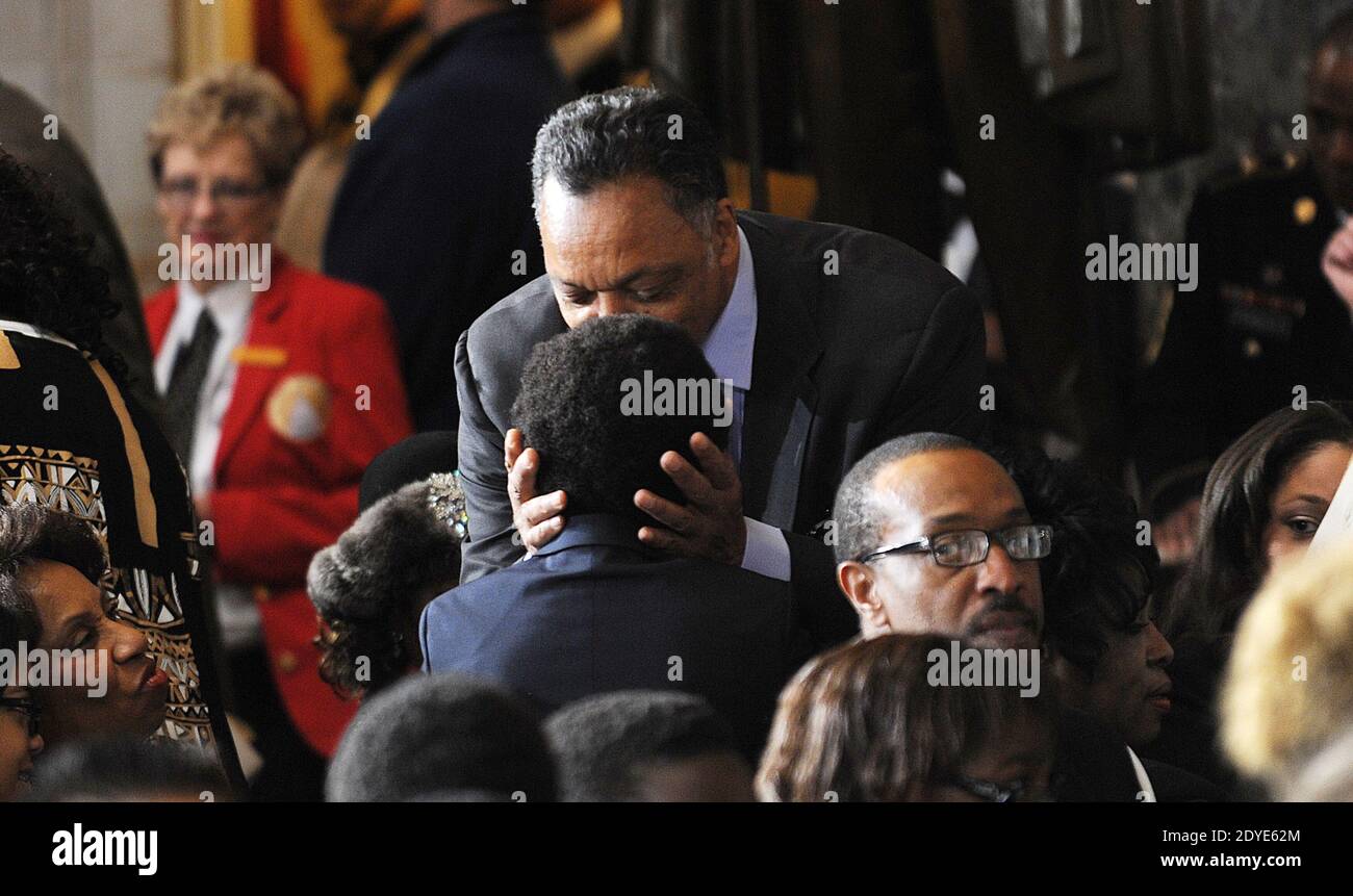 Reverend Jesse Jackson greats a guest during the unveiling of a statue ...
