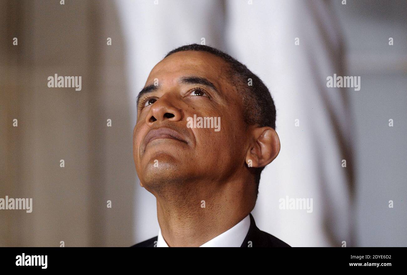 President Barack Obama looks on during the unveiling of a statue of ...