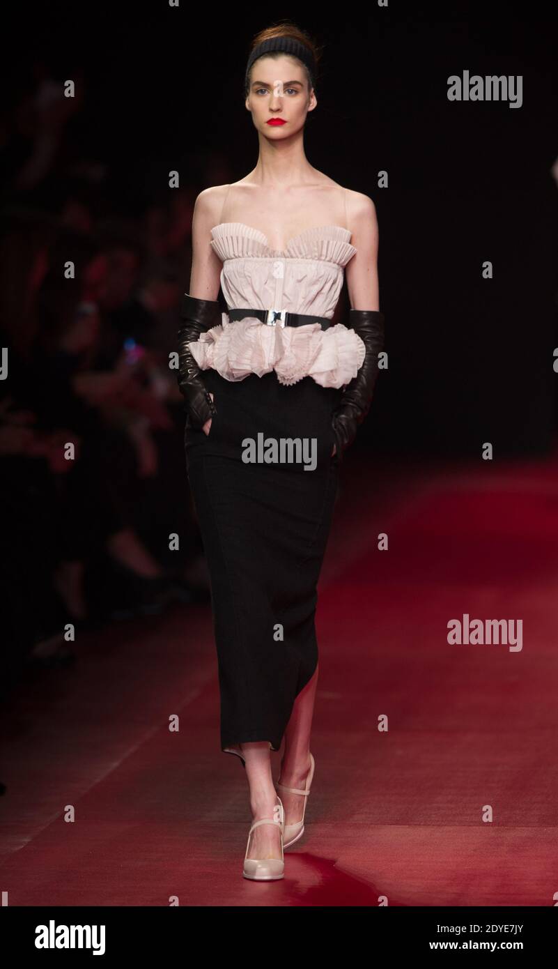 A model walks the runway for the Nina Ricci Fall-Winter 2013-2014 Ready ...