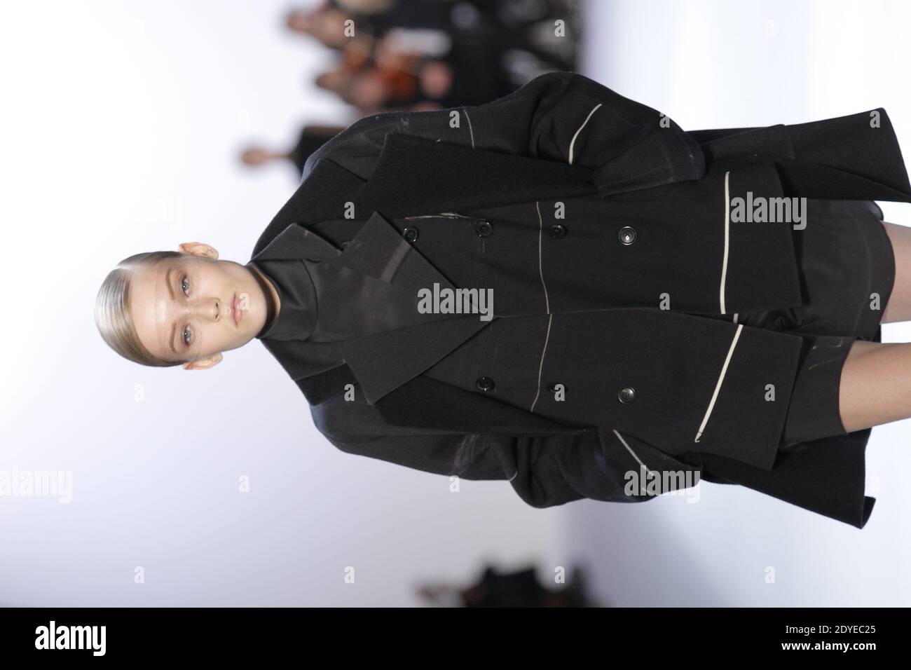 A model displays a creation by Albert Kreimer for Akris Fall-Winter ...
