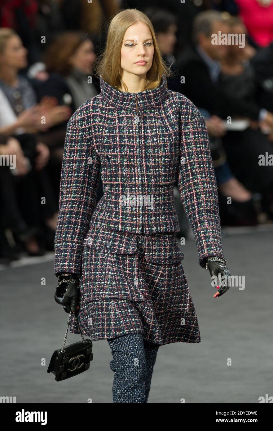 A model displays a creation by German designer Karl Lagerfeld as part ...