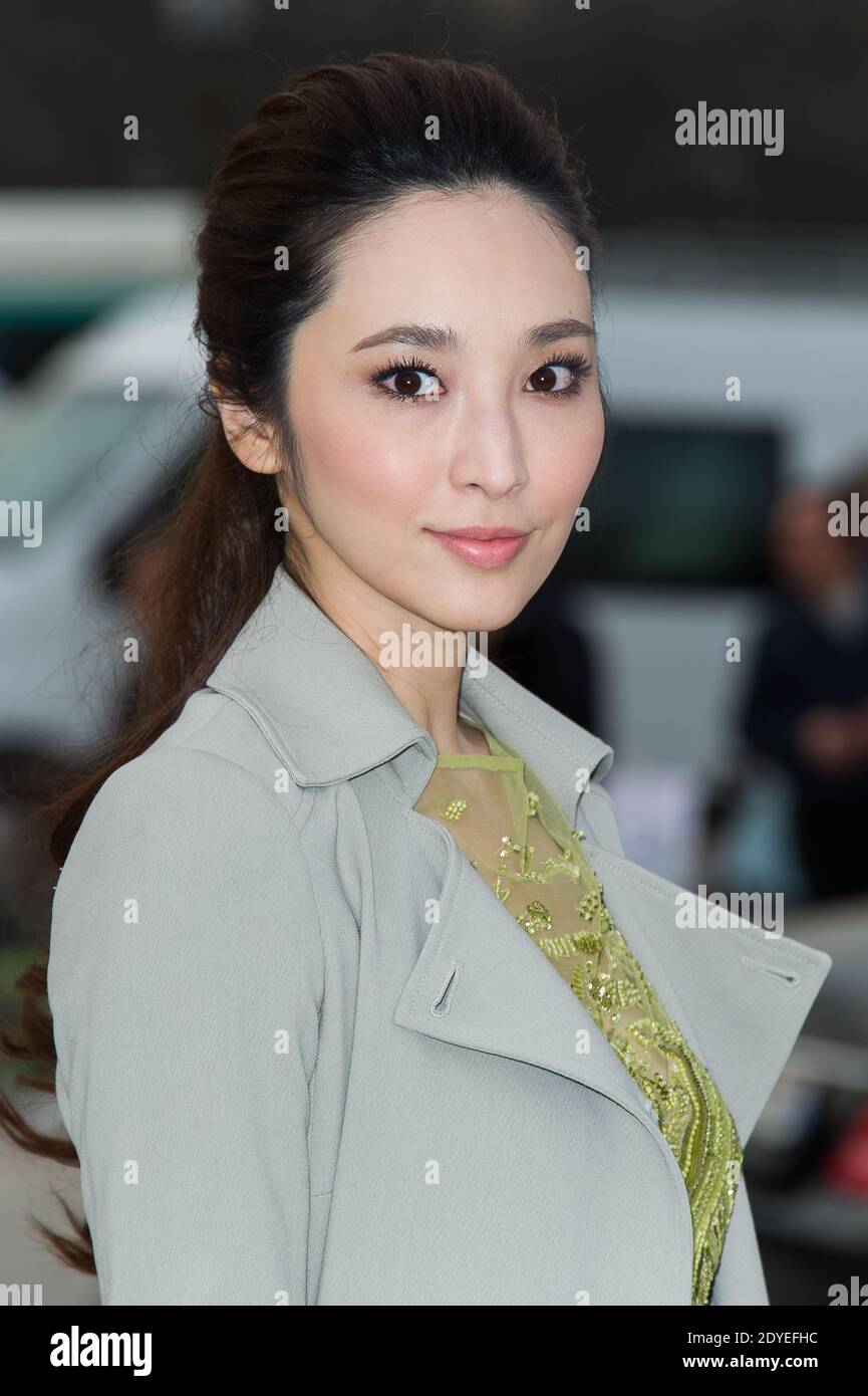 Pace Wu Pei-Ci arriving to the Elie Saab Fall-Winter 2013/2014 Ready-to-Wear collection show ...