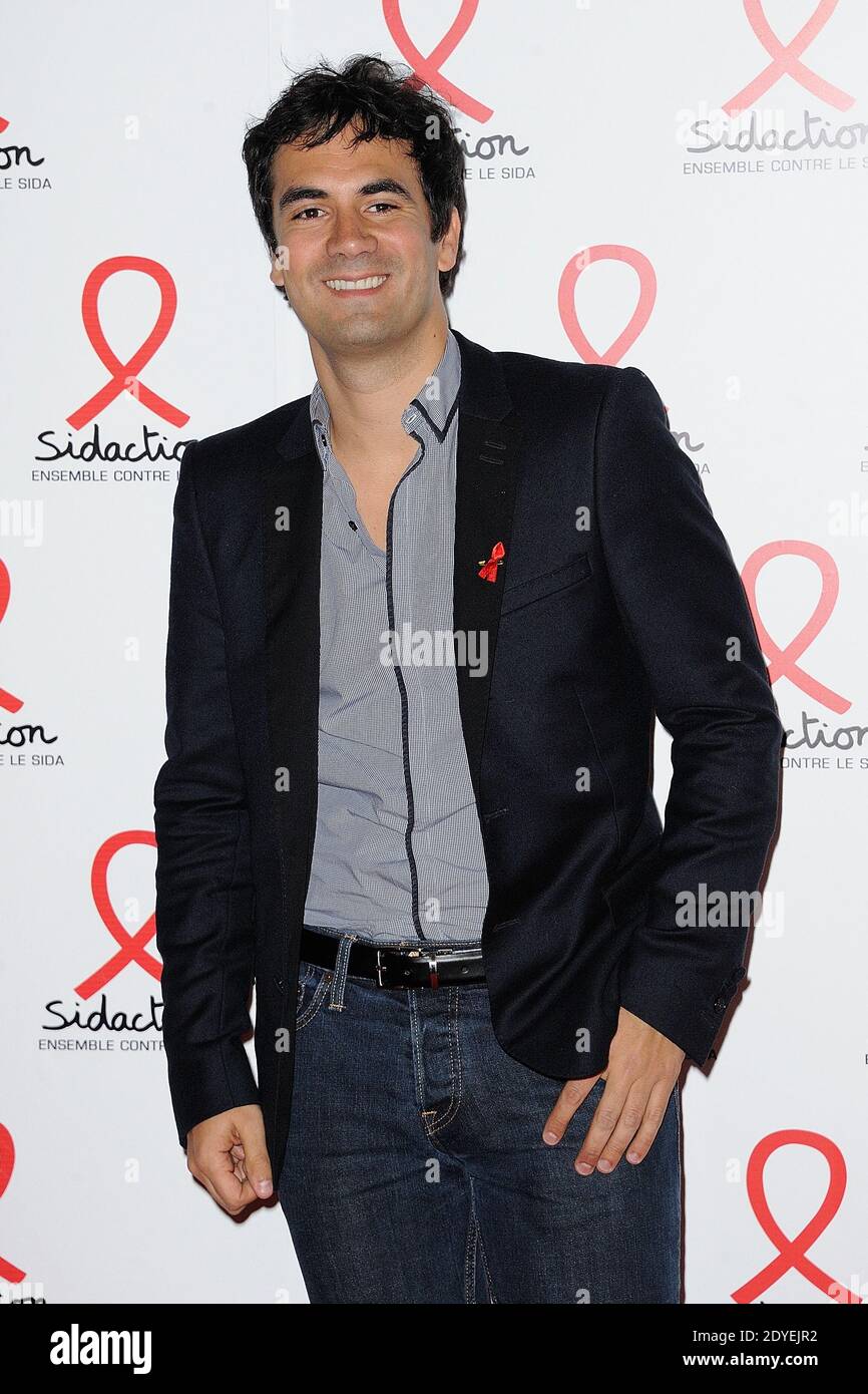 Alex Goude posing at a photocall for the launch of the 2013 Sidaction ...