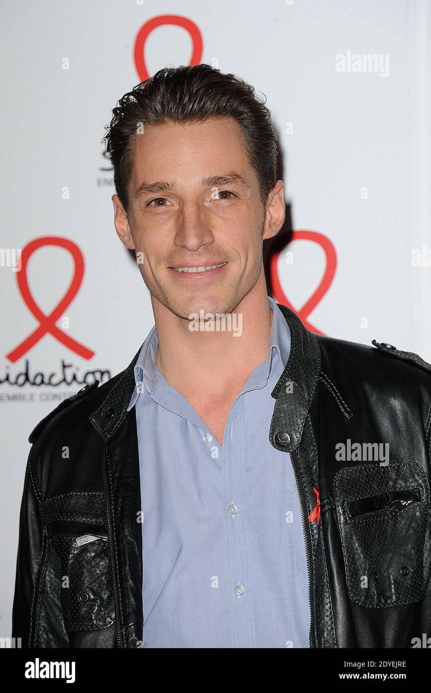 David Lantin posing at a photocall for the launch of the 2013 Sidaction ...