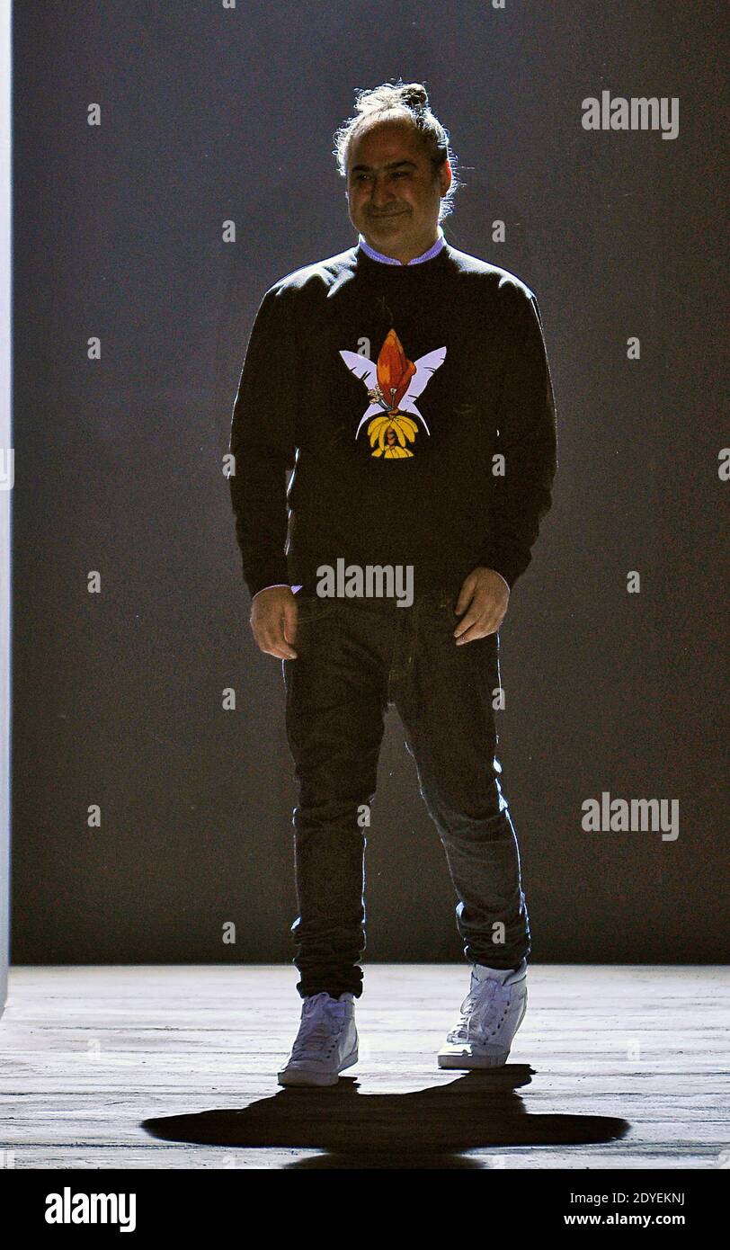 Designer Hakaan Yildirim appears on the runway for his Fall-Winter 2013 ...