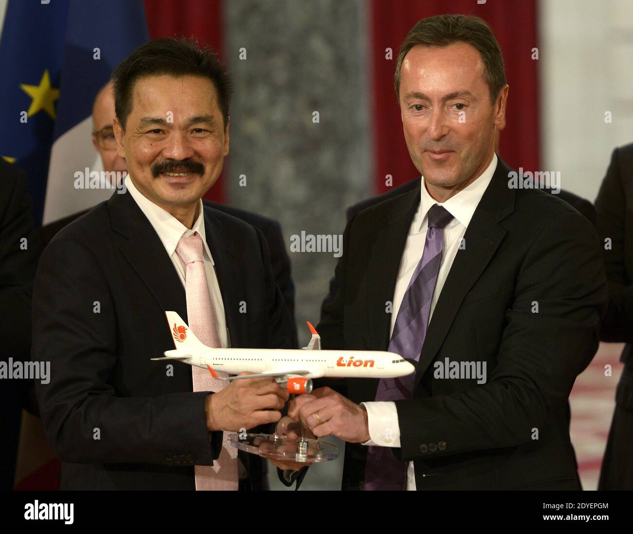 French CEO of European aerospace giant Airbus Fabrice Bregier (C, right ...