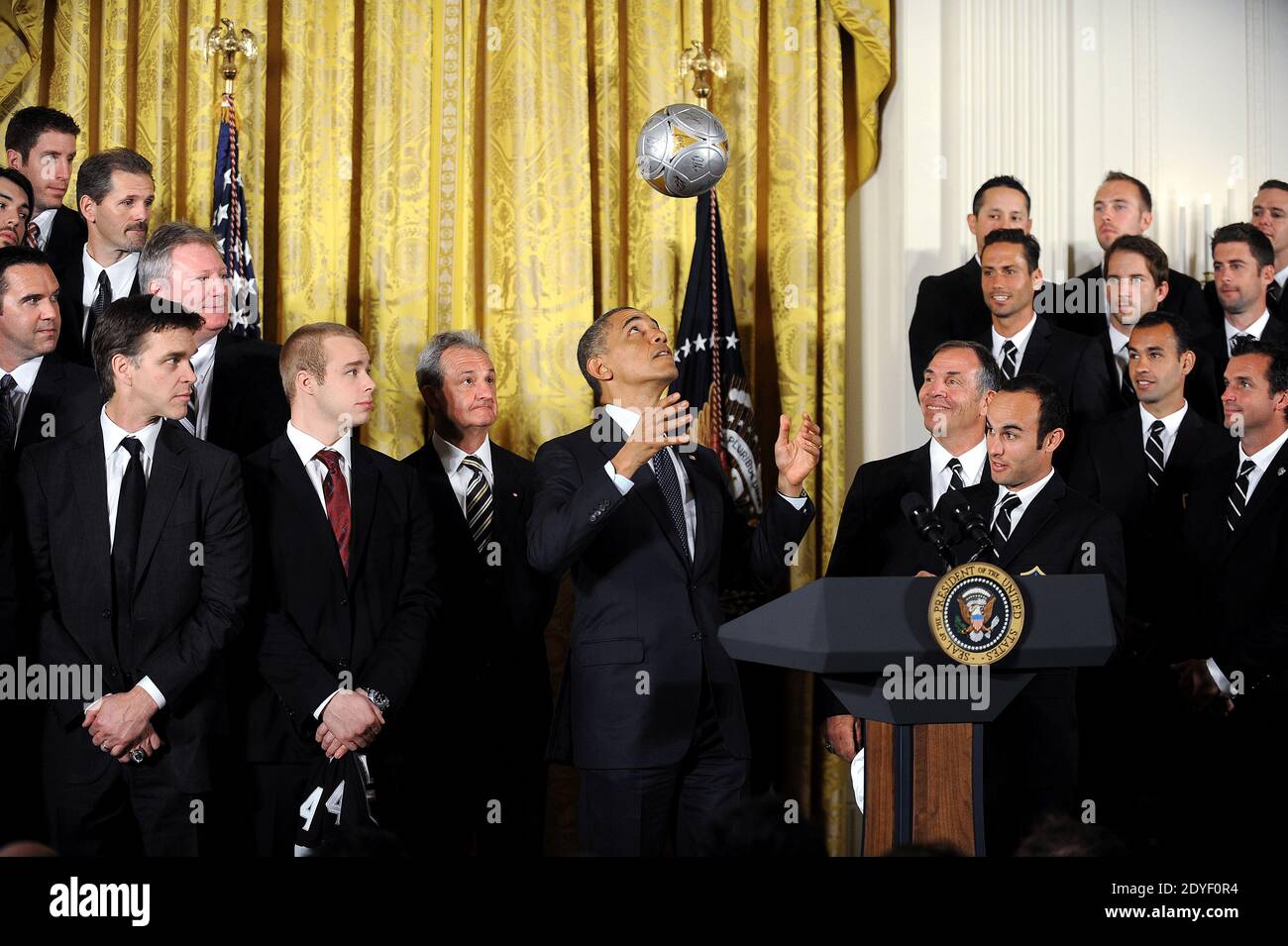 U.S. President Barack Obama juggles with a soccer ball as he welcome ...