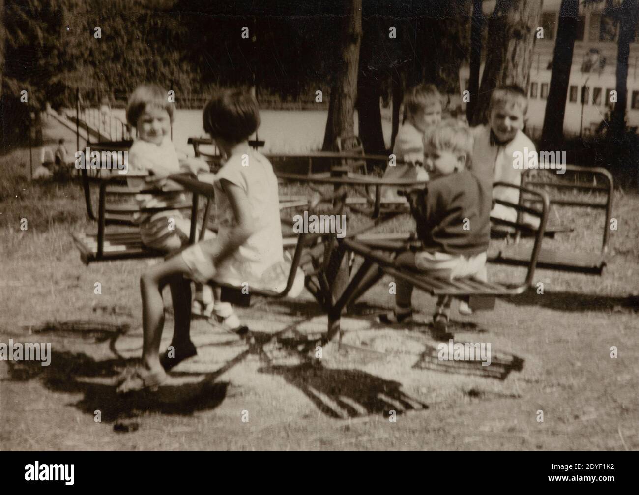 ROVIGO, ITALY 18 JUNE 1965: Children play at park in 60s Stock Photo ...