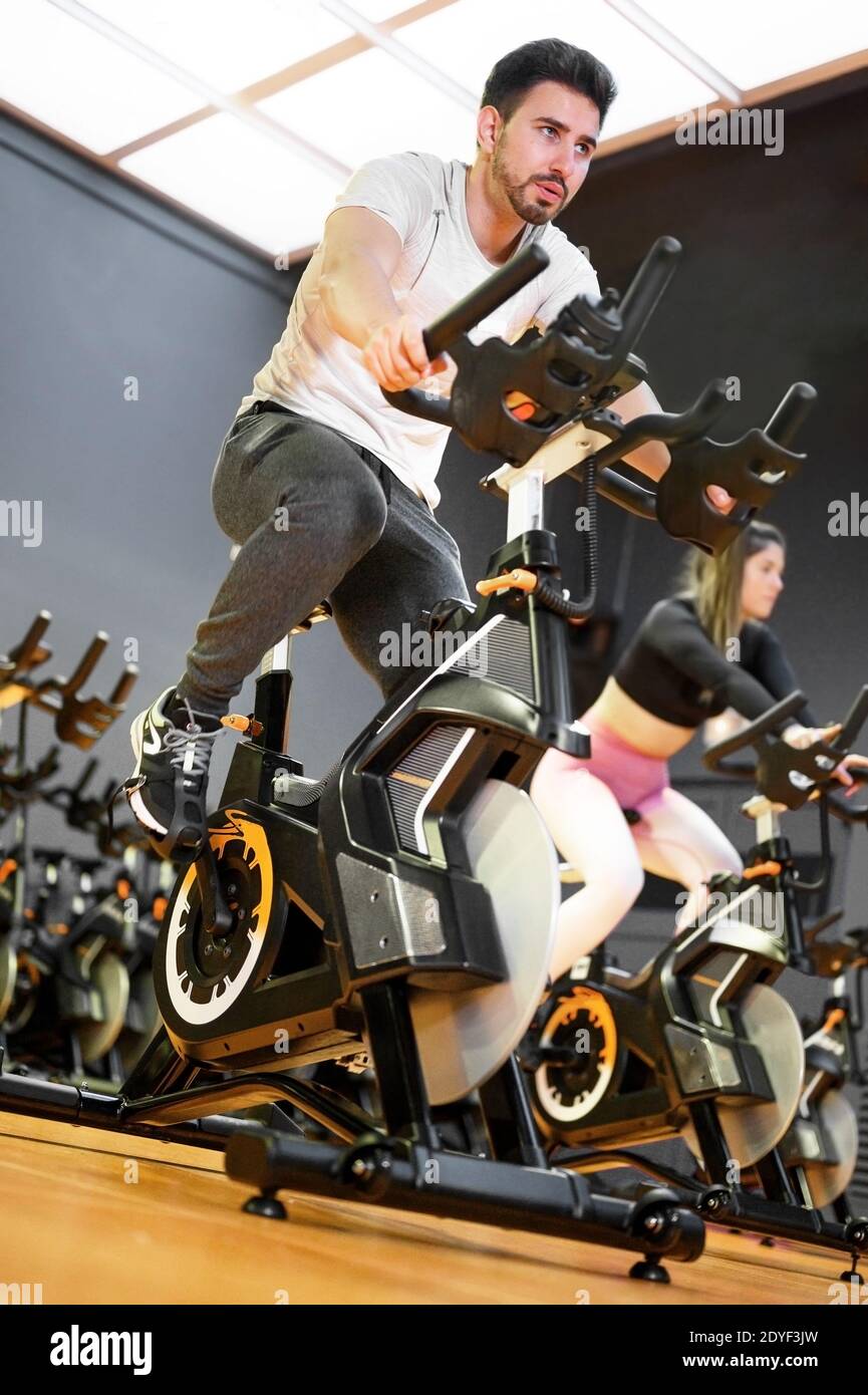 People cycling at gym. High quality photo Stock Photo - Alamy