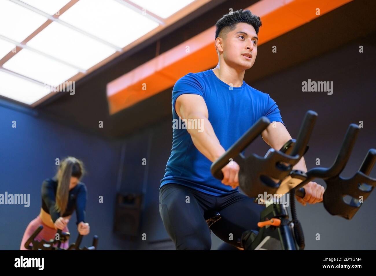 People cycling at gym. High quality photo Stock Photo - Alamy