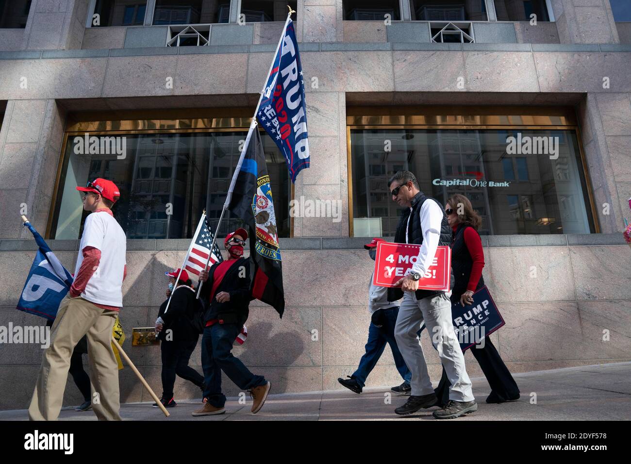 Supporters of US president Donald Trump arrive for a rally at Freedom ...