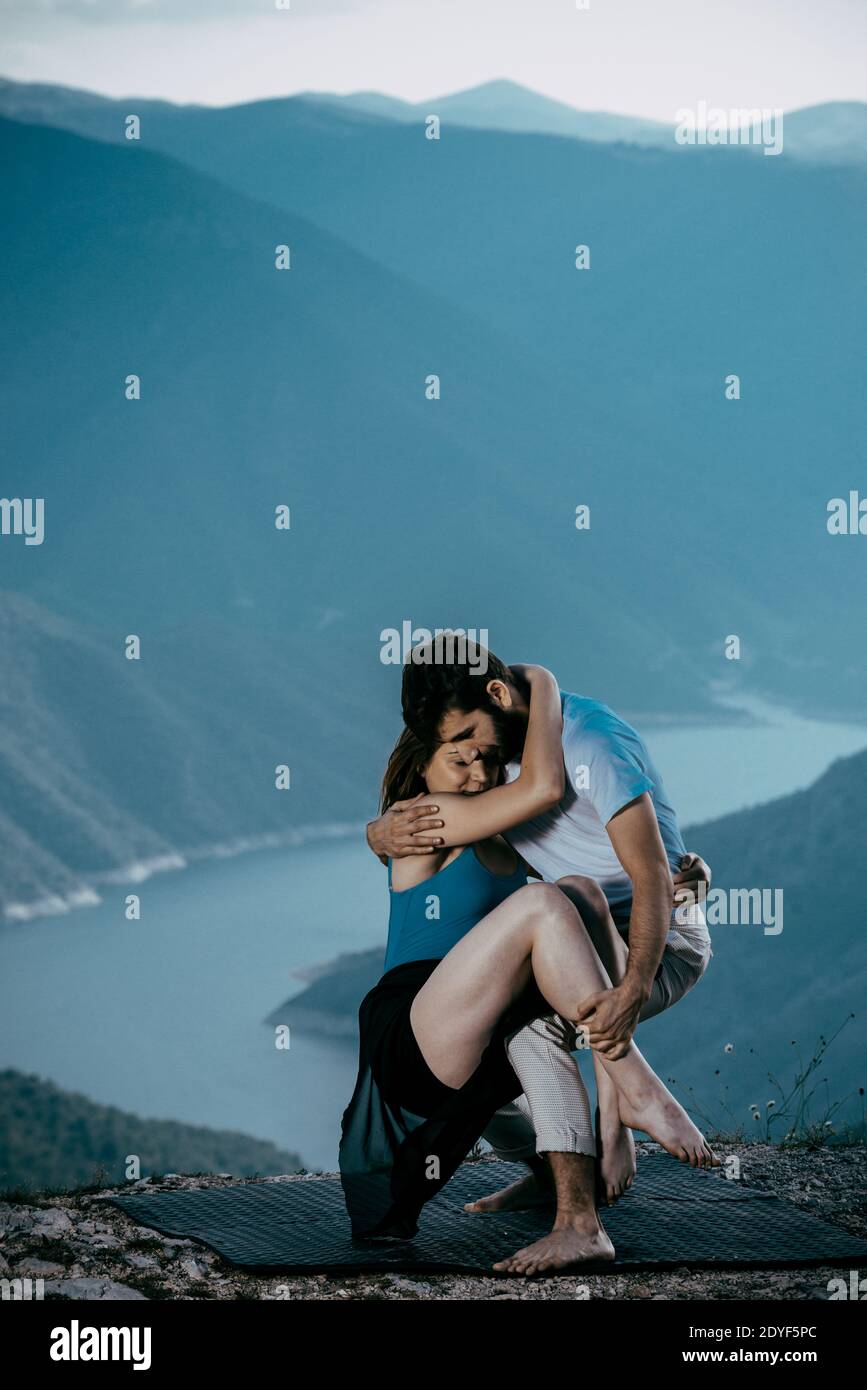 Sensual couple performing an artistical and emotional contemporary ...