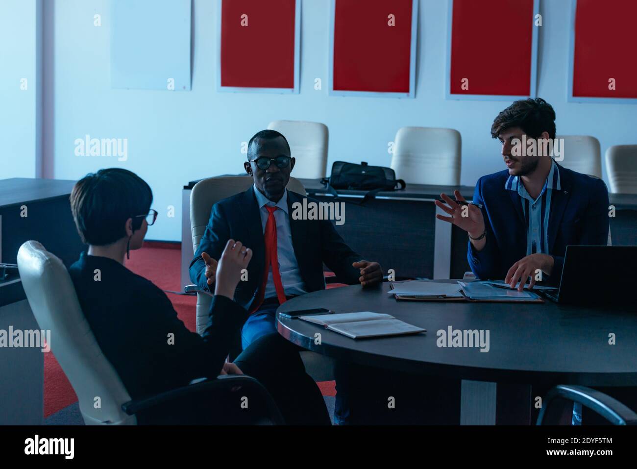 Corporate business team and manager in a meeting. Team building meeting ...