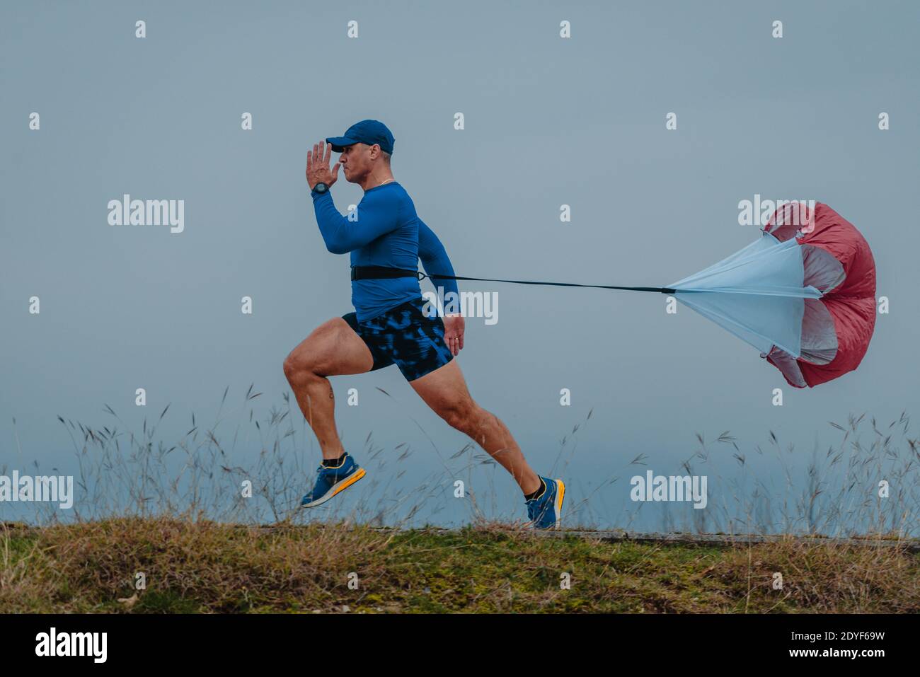 Runner man running with concentration, determination and strength ...