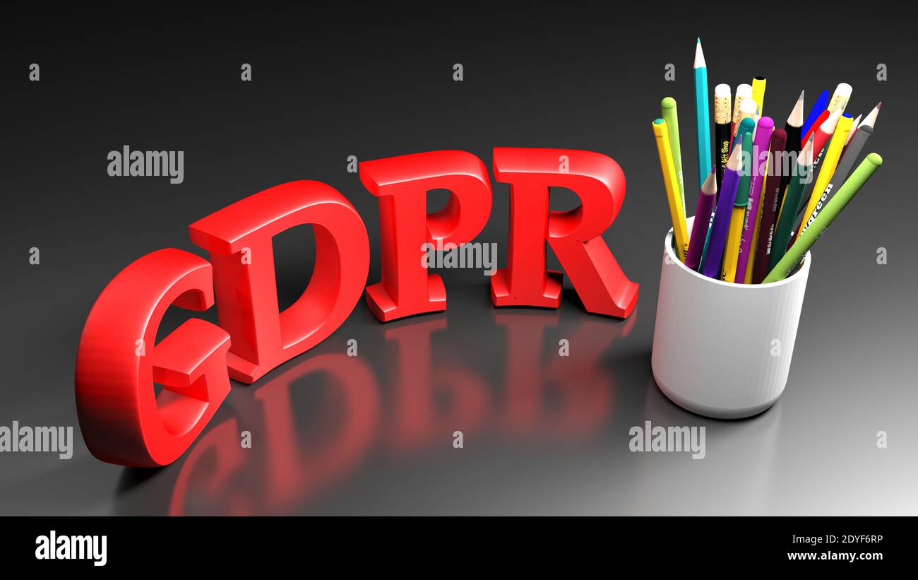 GDPR red write on a black glossy desk, near a pen holder full of pens ...