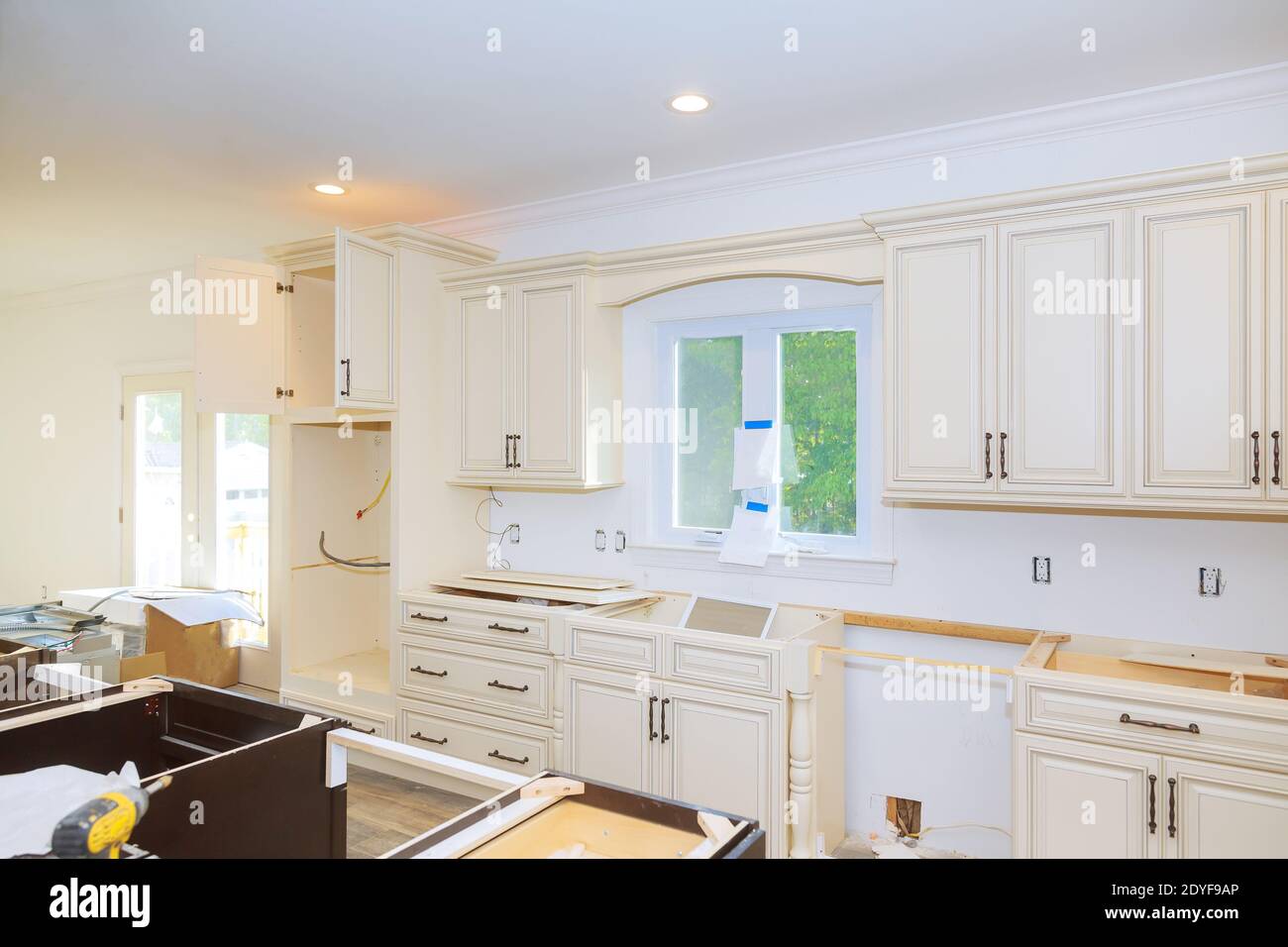 New cabinet in a home improvement kitchen view installed of ...