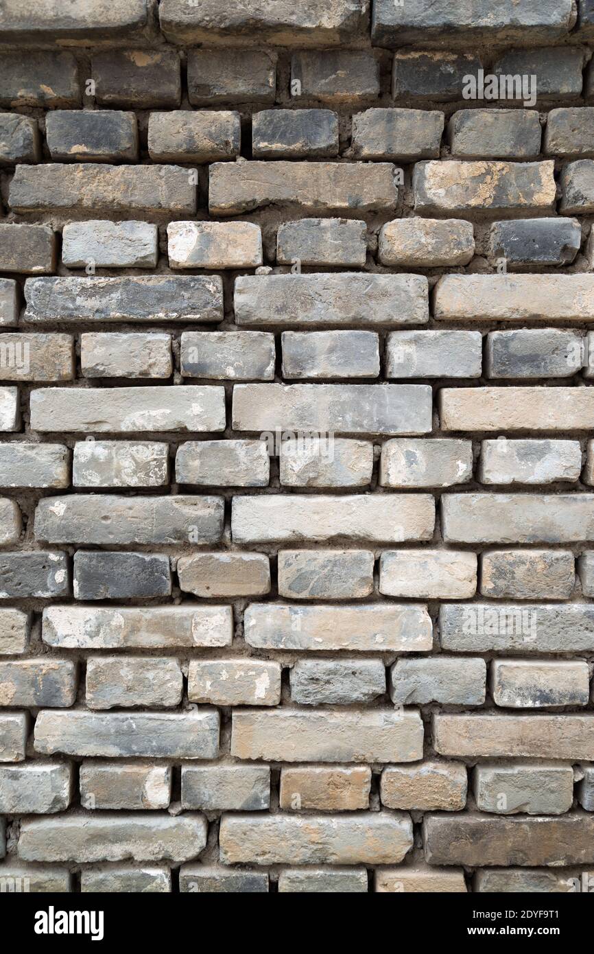Old gray brick wall background Stock Photo - Alamy