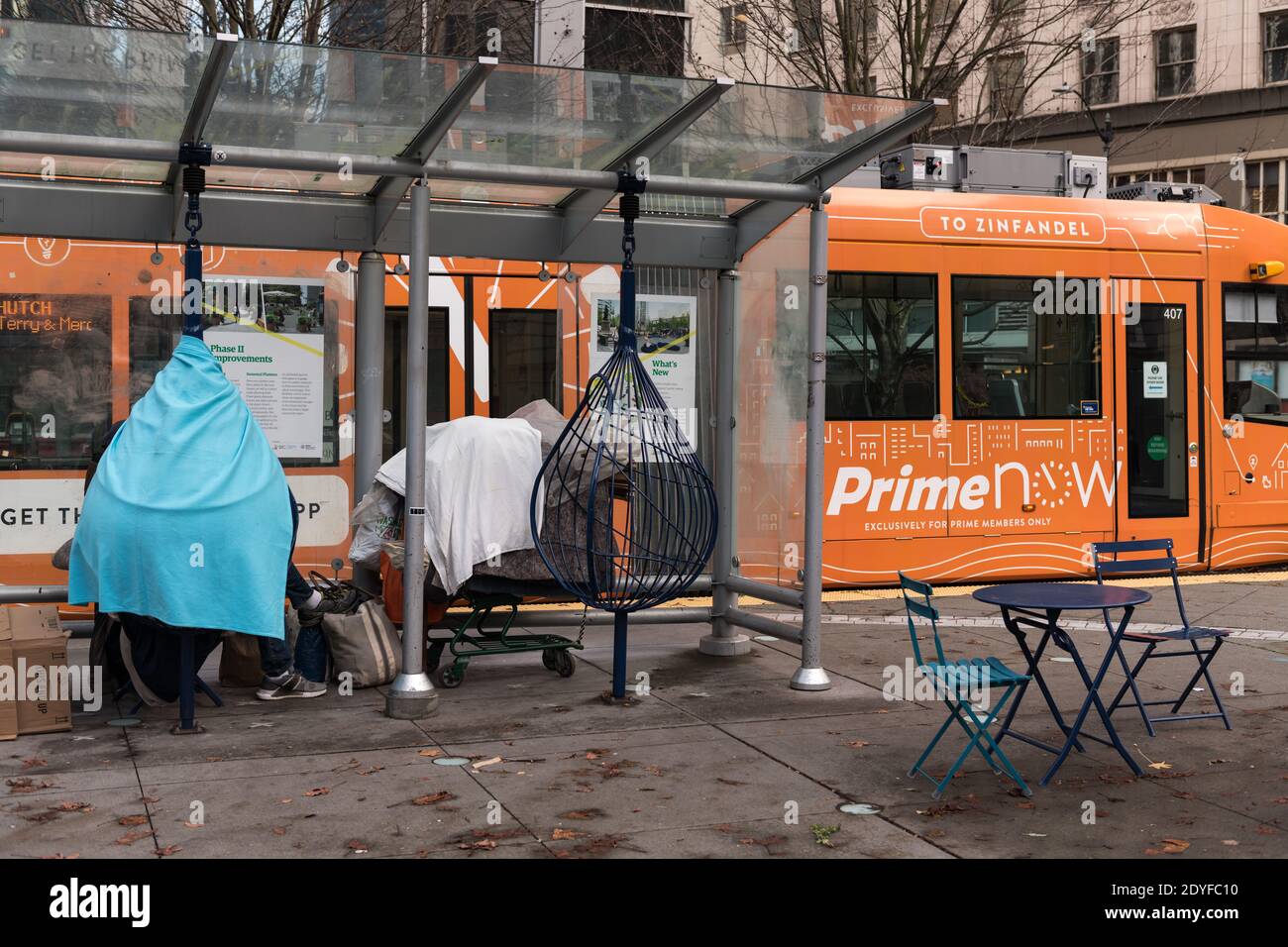Seattle, USA. 17th Dec, 2020. Late in the day a homeless person living ...