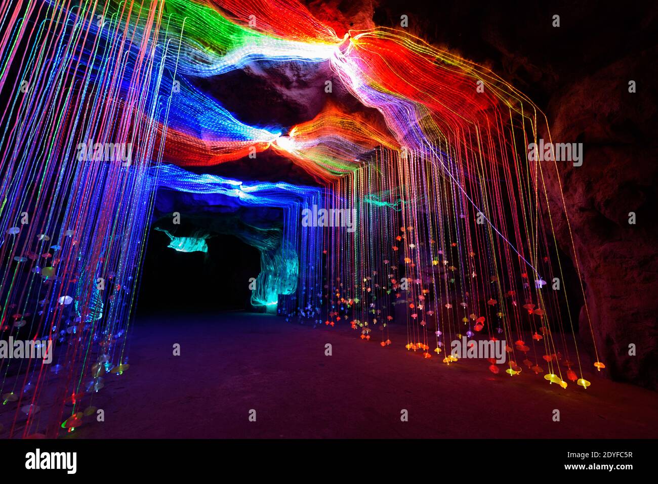 Lighting decorate on the cave like waterfall shape in lighting festival ...