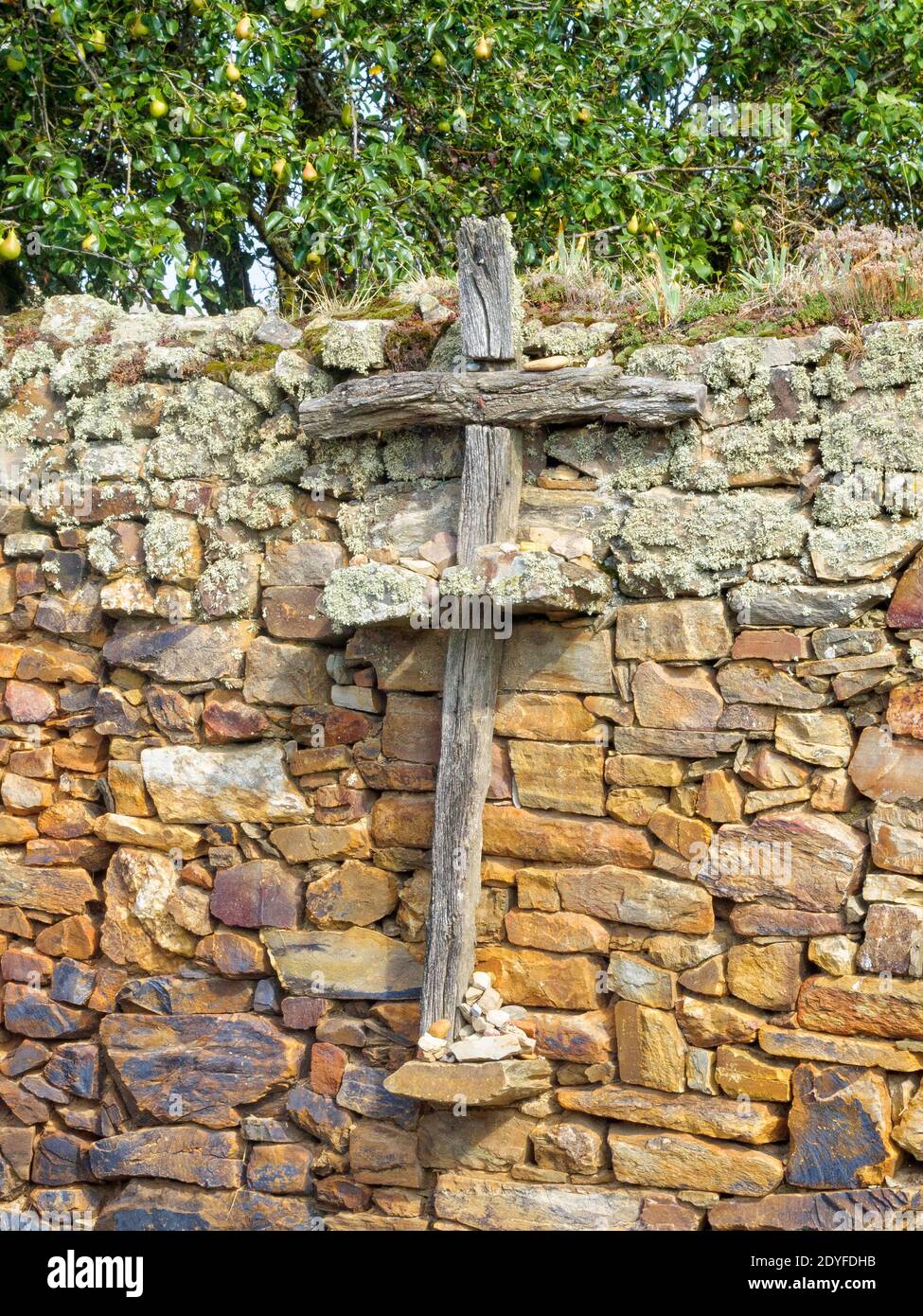Wooden cross on a stone wall - El Ganso, Castile and Leon, Spain Stock ...