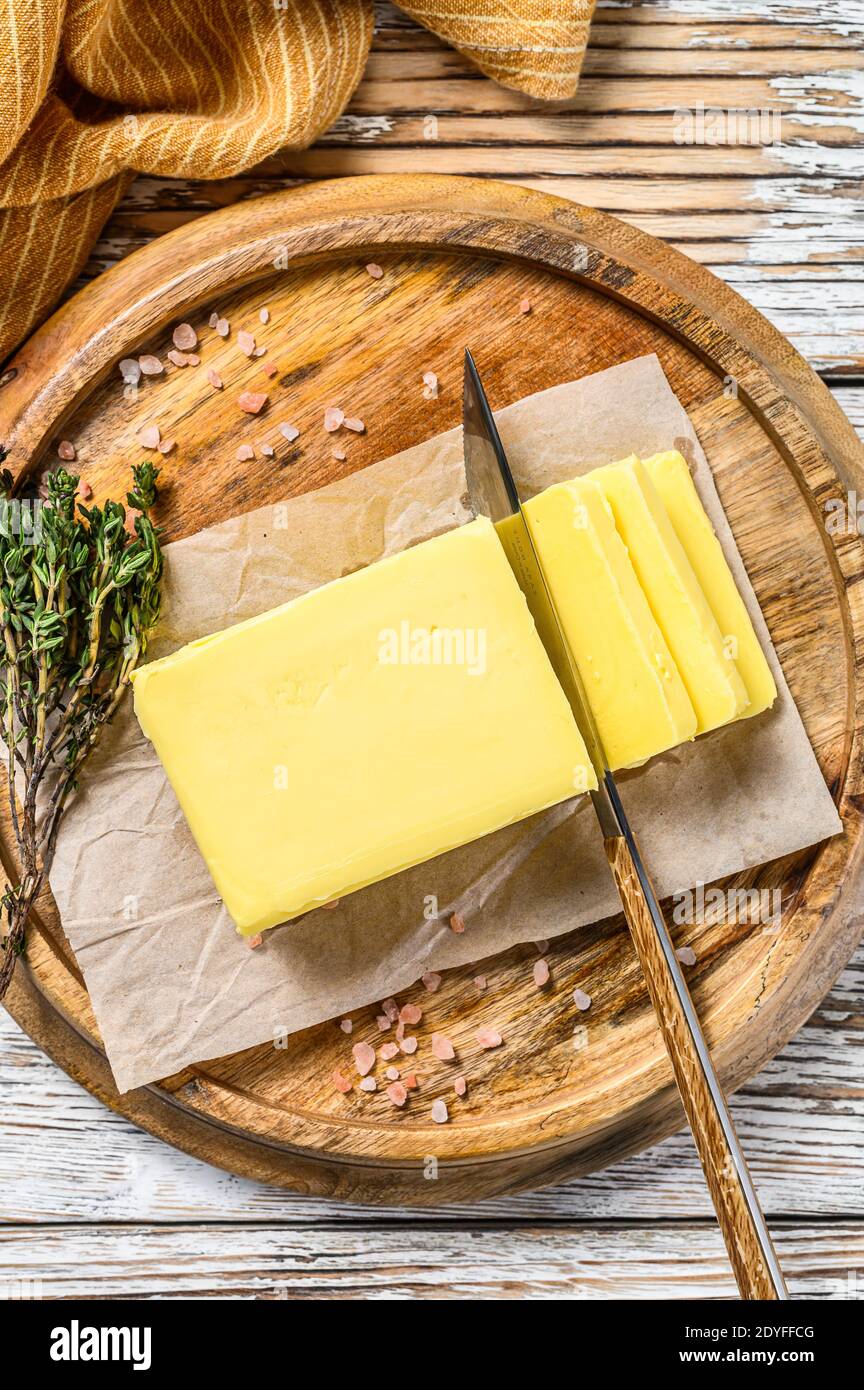 Farm Butter, organic dairy products. White wooden background.Top view ...