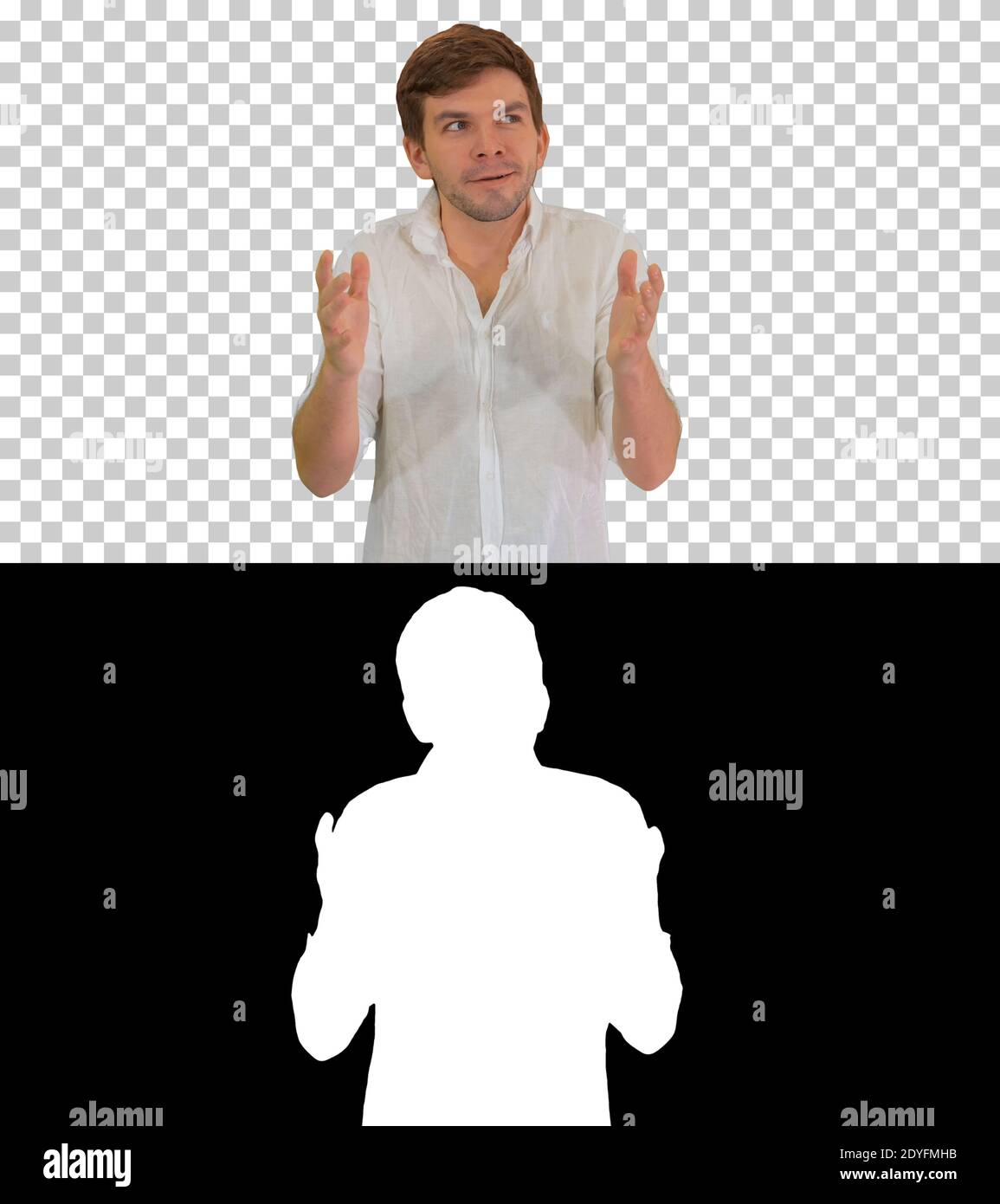 Excited young man in casual clothes looking into camera telling Stock ...