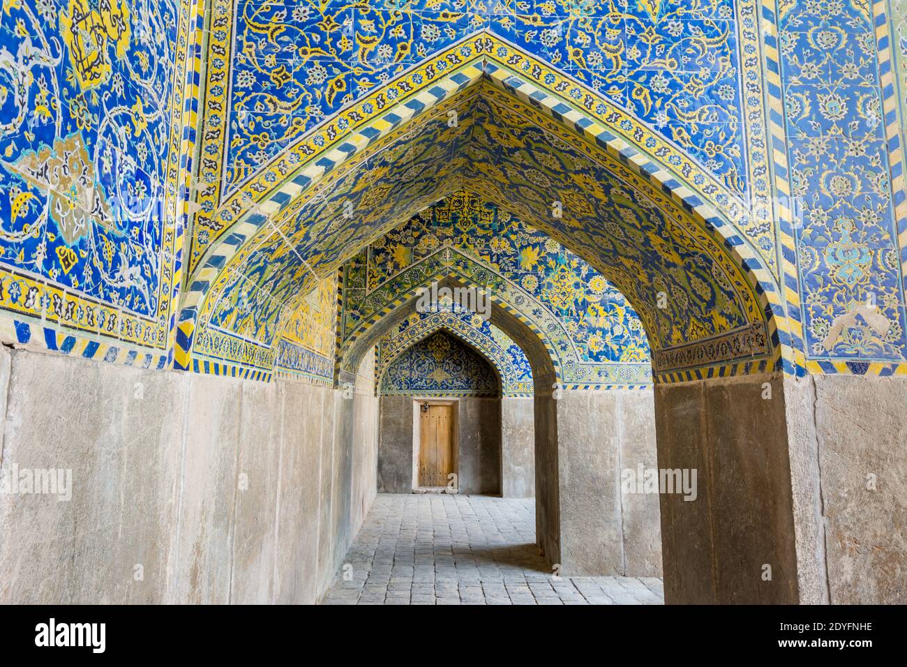 Arches of Historic buildings with persian blue tiles on the wall of ...