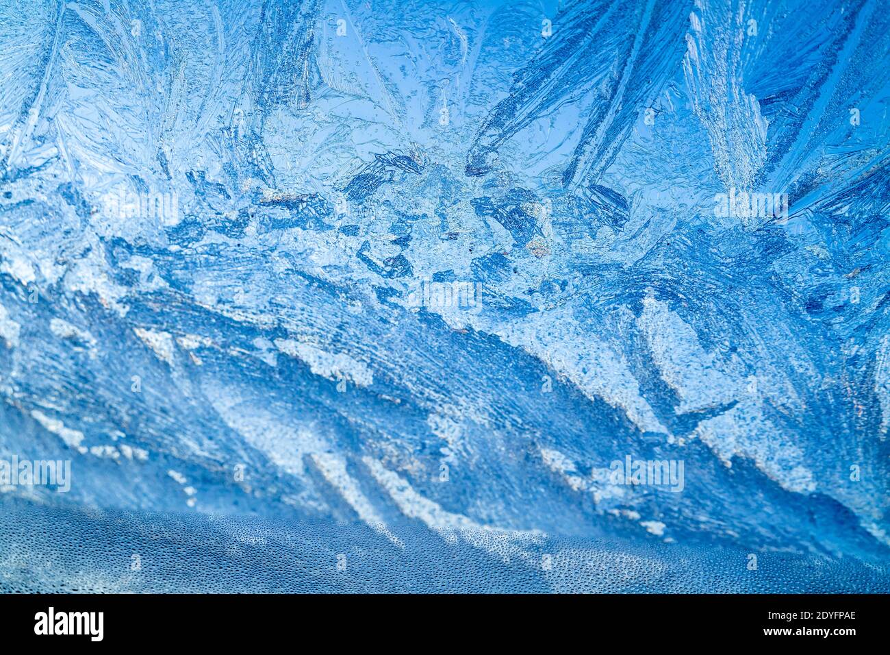 Beautiful natural frosty pattern on glass window Stock Photo - Alamy