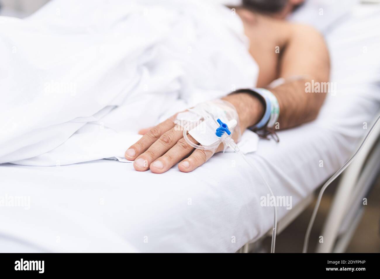 Patient lying in hospital bed after surgery. Hospitalization and ...
