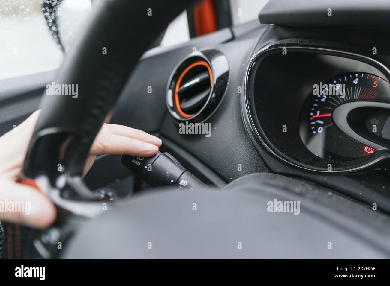 man's hand in the car putting the turn signal. driving concept Stock ...