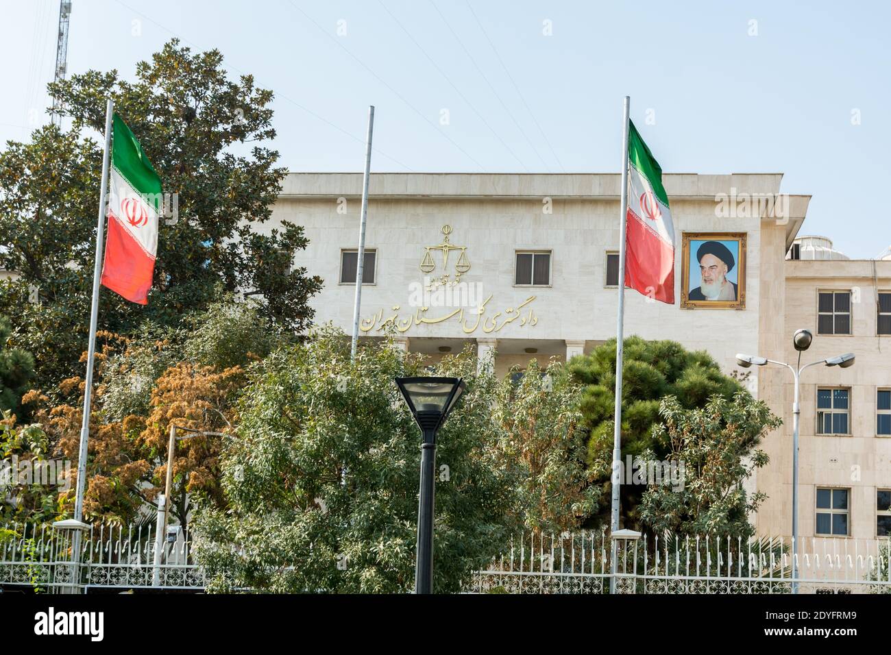 Iran High court in Tehran with former leader Khomeini and Khamenei ...