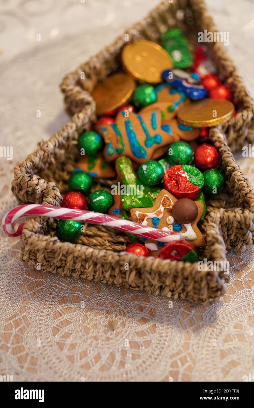 A vertical shot of candies in a Christmas tree-shaped container Stock ...