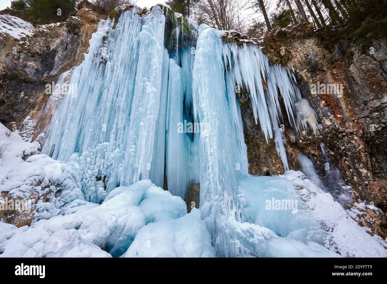 Frozen waterfall in winter time in the mountains Stock Photo - Alamy