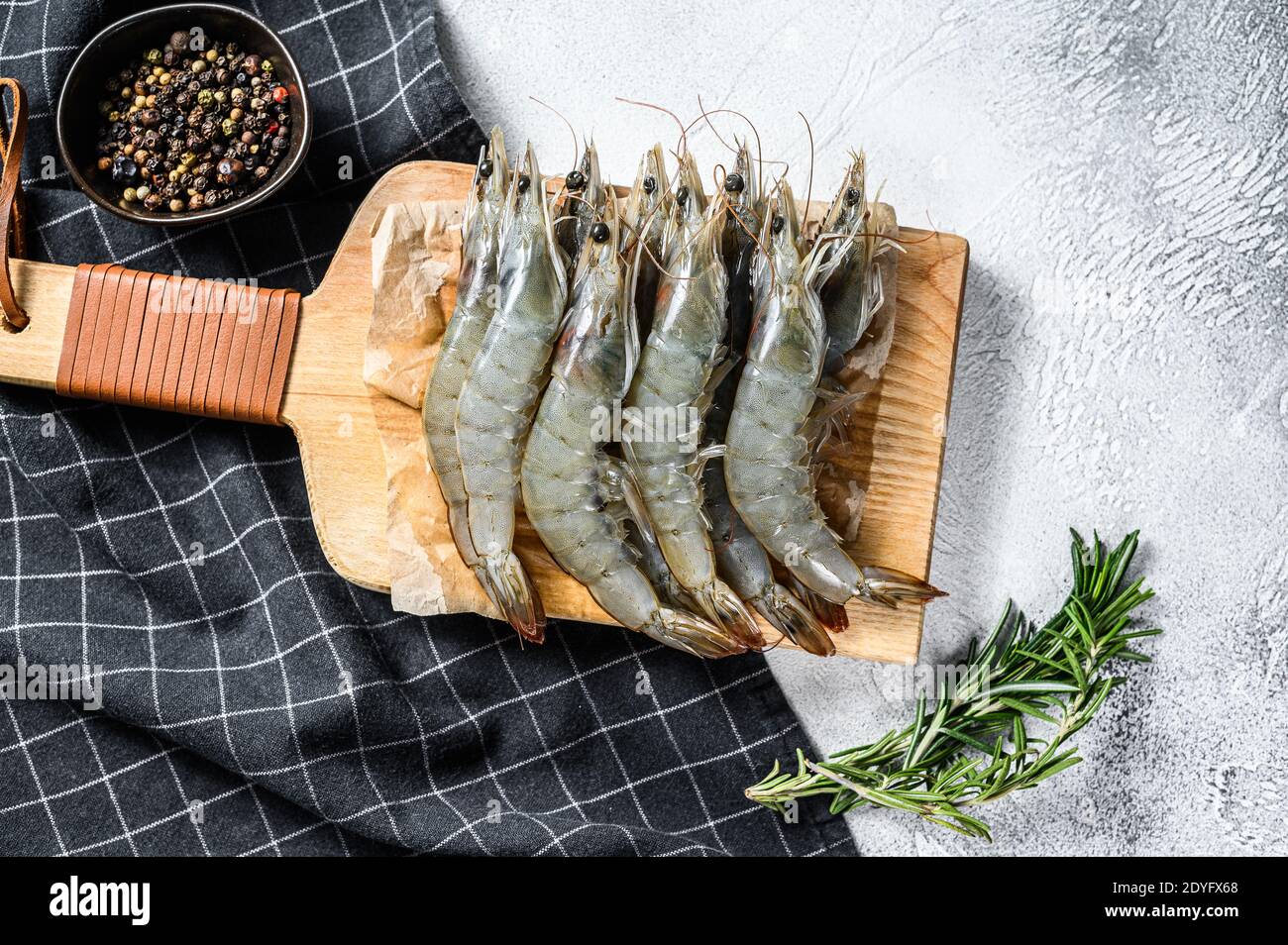 Fresh raw tiger prawns, shrimps and spices. Gray background. Top view ...