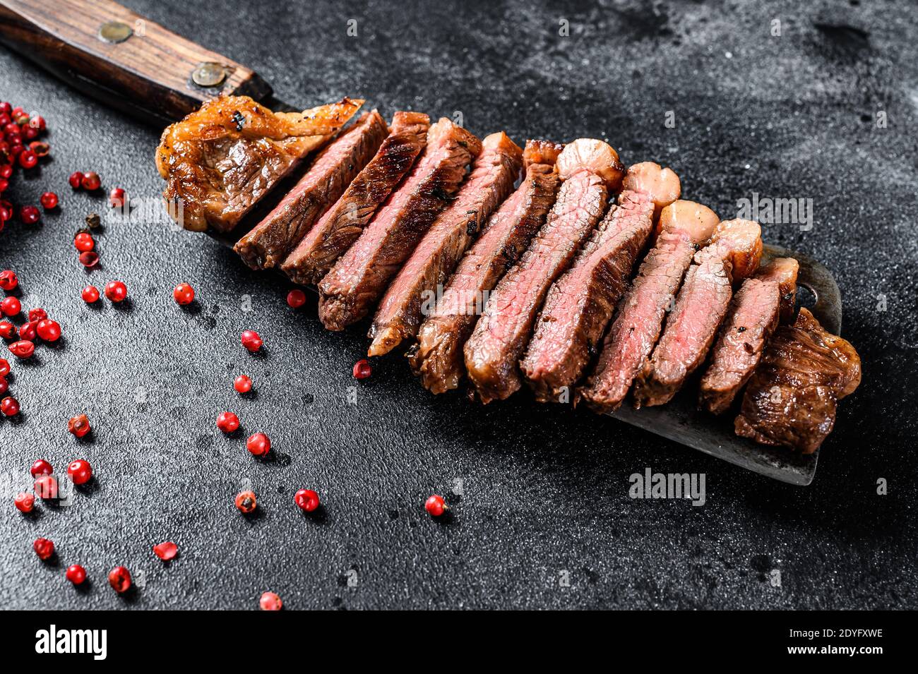 Grilled marbled beef steak. Black background. Top view Stock Photo - Alamy