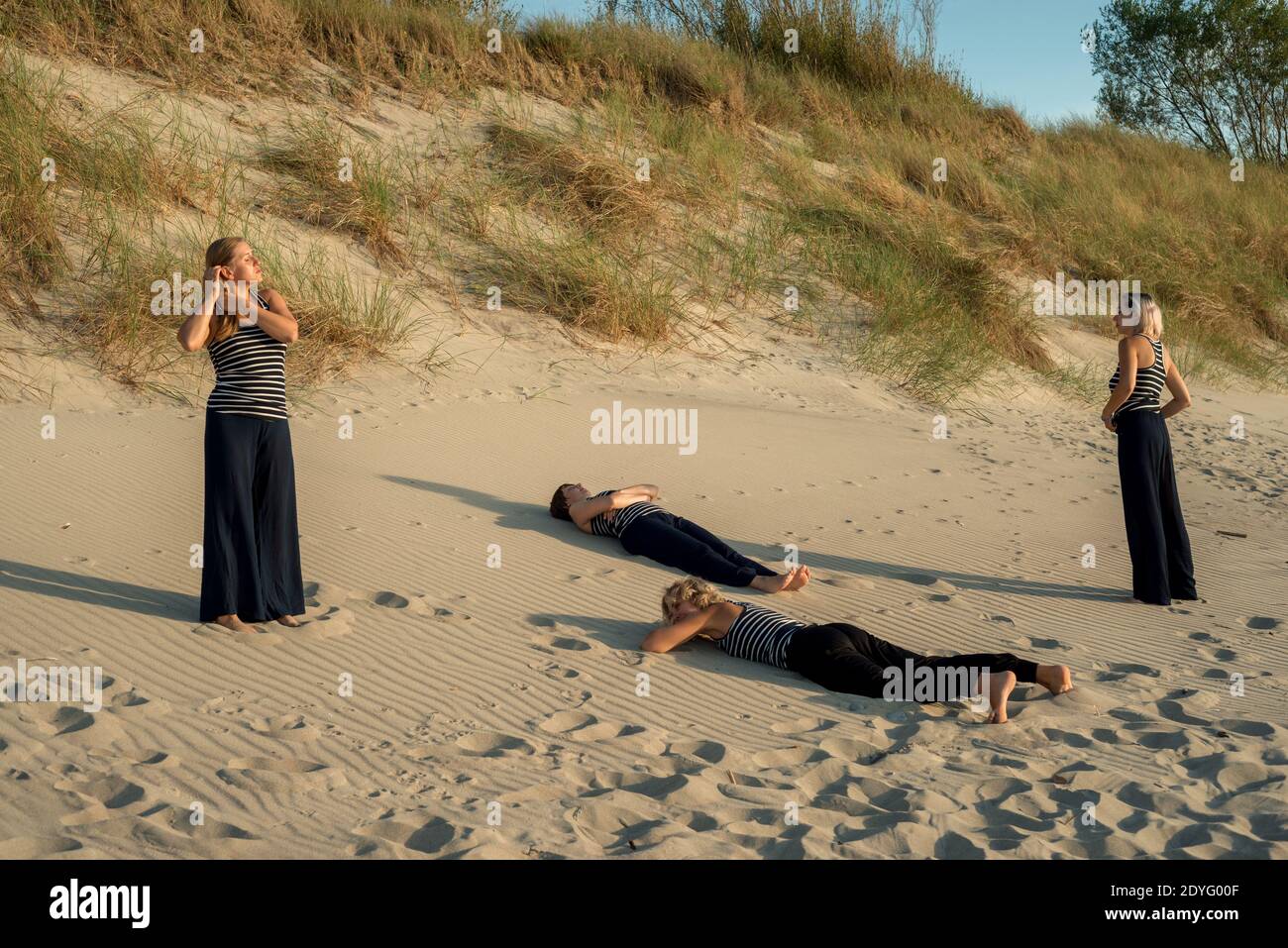 Group of women engaged in bodily practice in nature Stock Photo - Alamy
