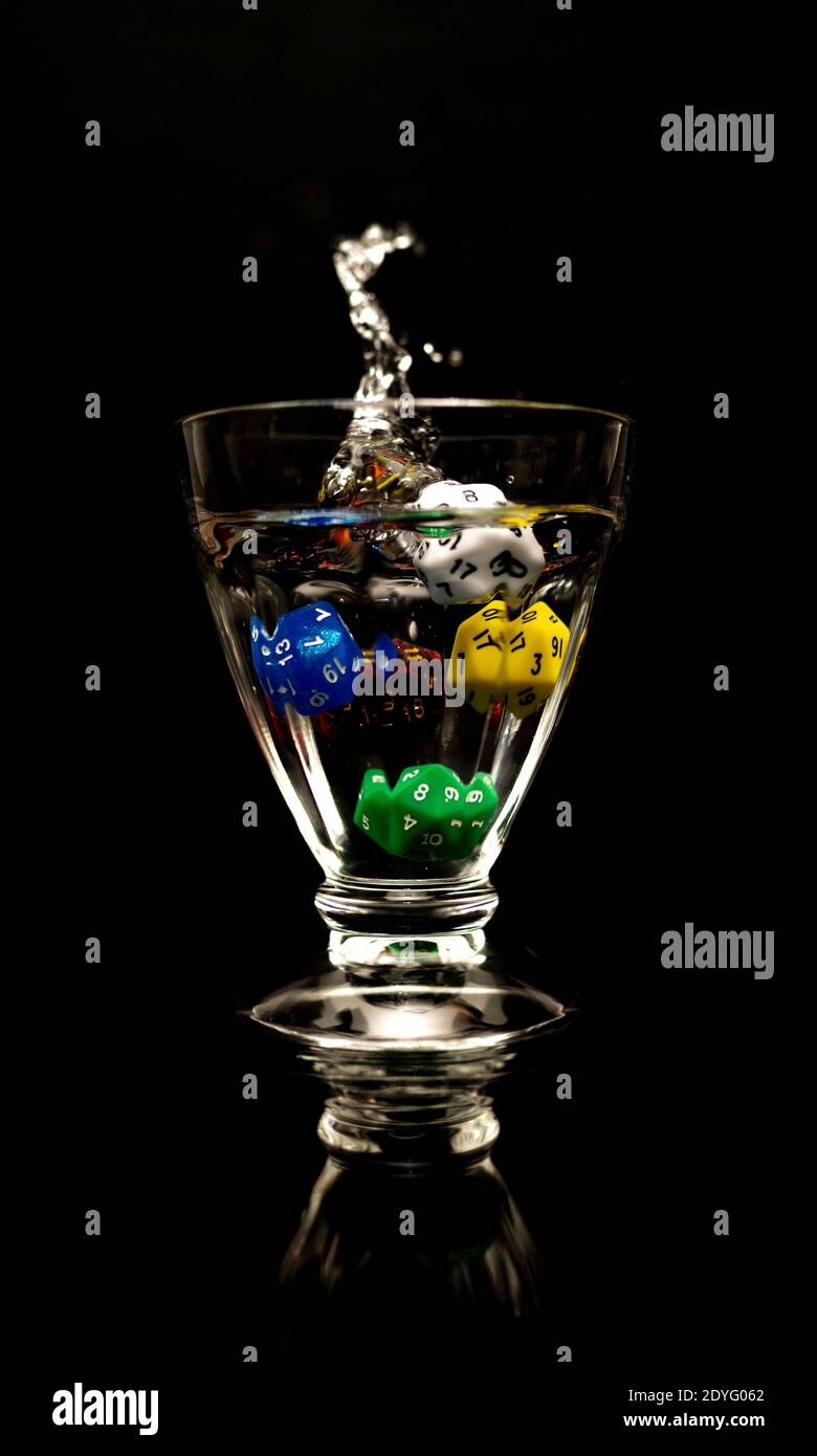 Dice theme. Water Splash on a black background with reflection ...