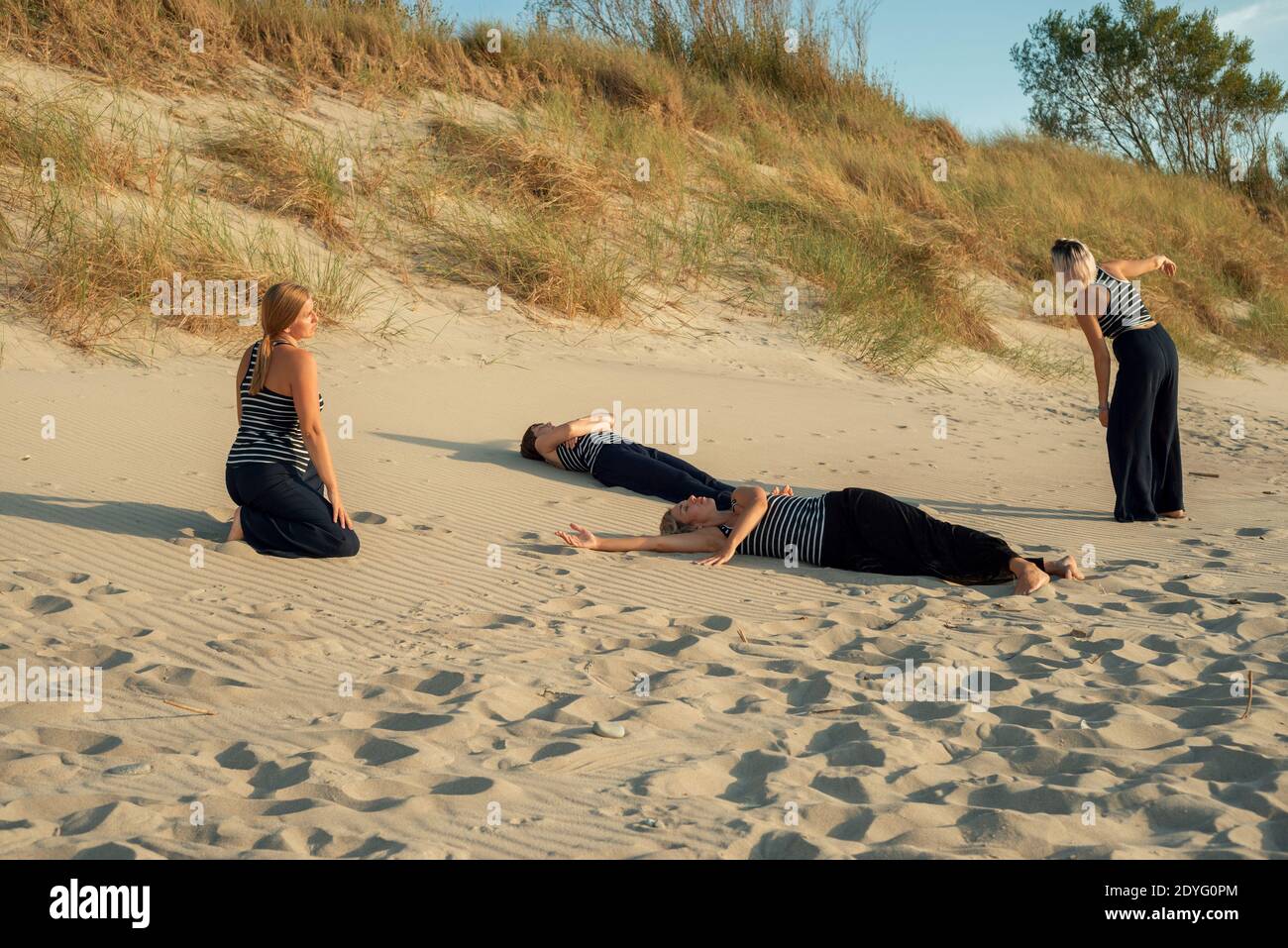 Group of women engaged in bodily practice in nature Stock Photo - Alamy